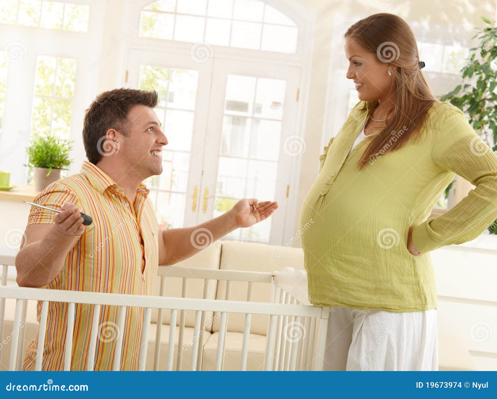 Laughing Parents Expecting Baby Stock Photo - Image of focus, expectant ...