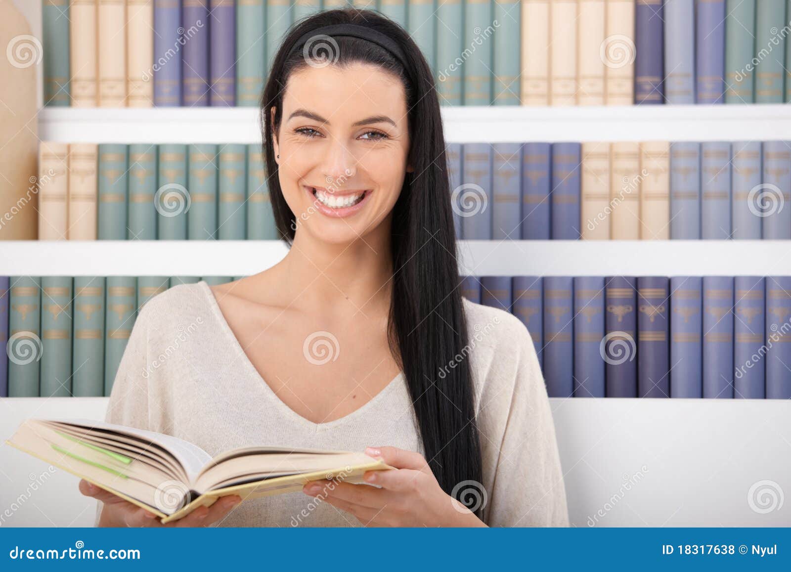 Laughing woman with book stock photo. Image of attractive - 18317638