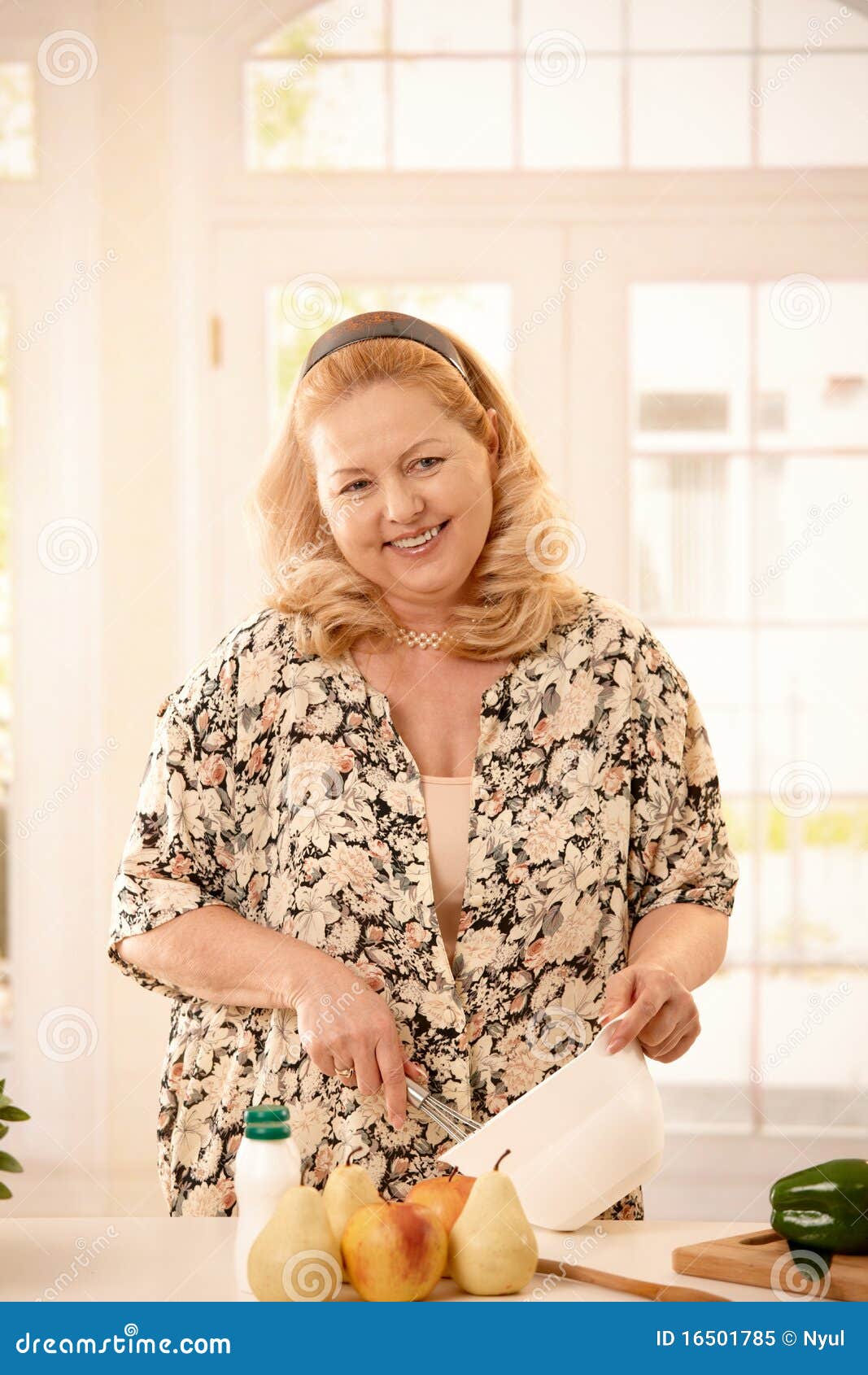 Laughing woman in kitchen stock image. Image of cheerful - 16501785