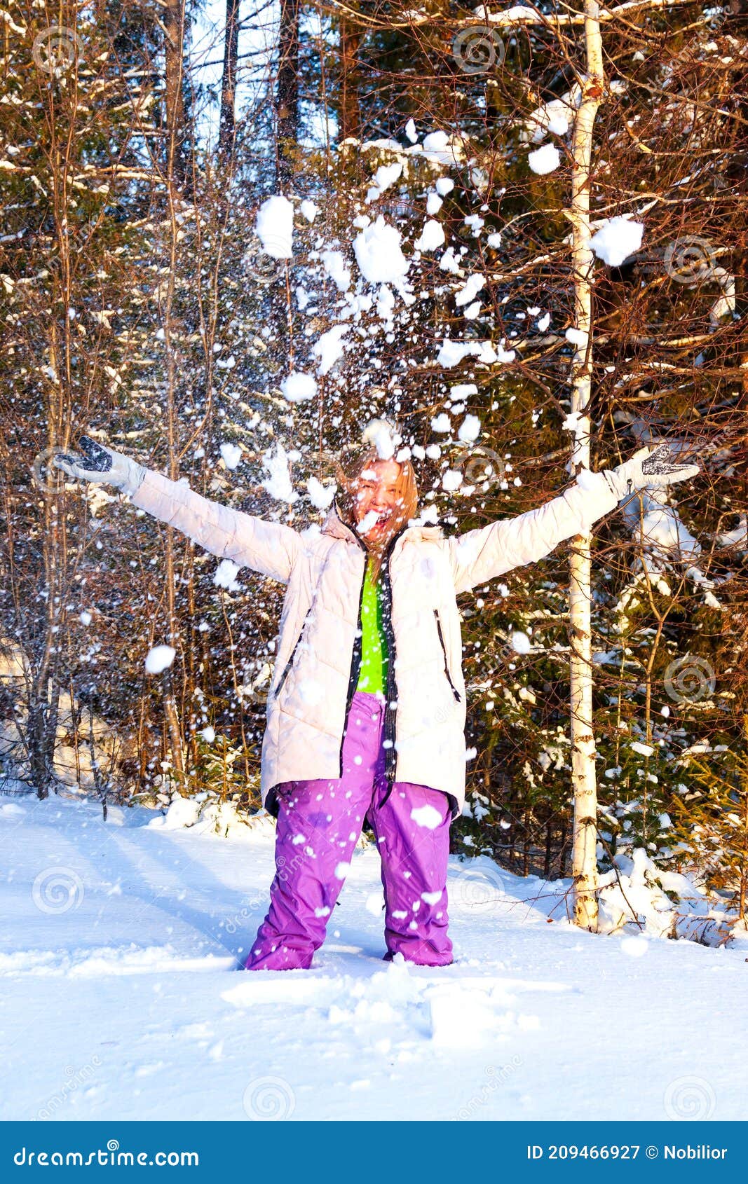 Laughing Woman Throwing Snow into the Air Stock Image - Image of girl ...