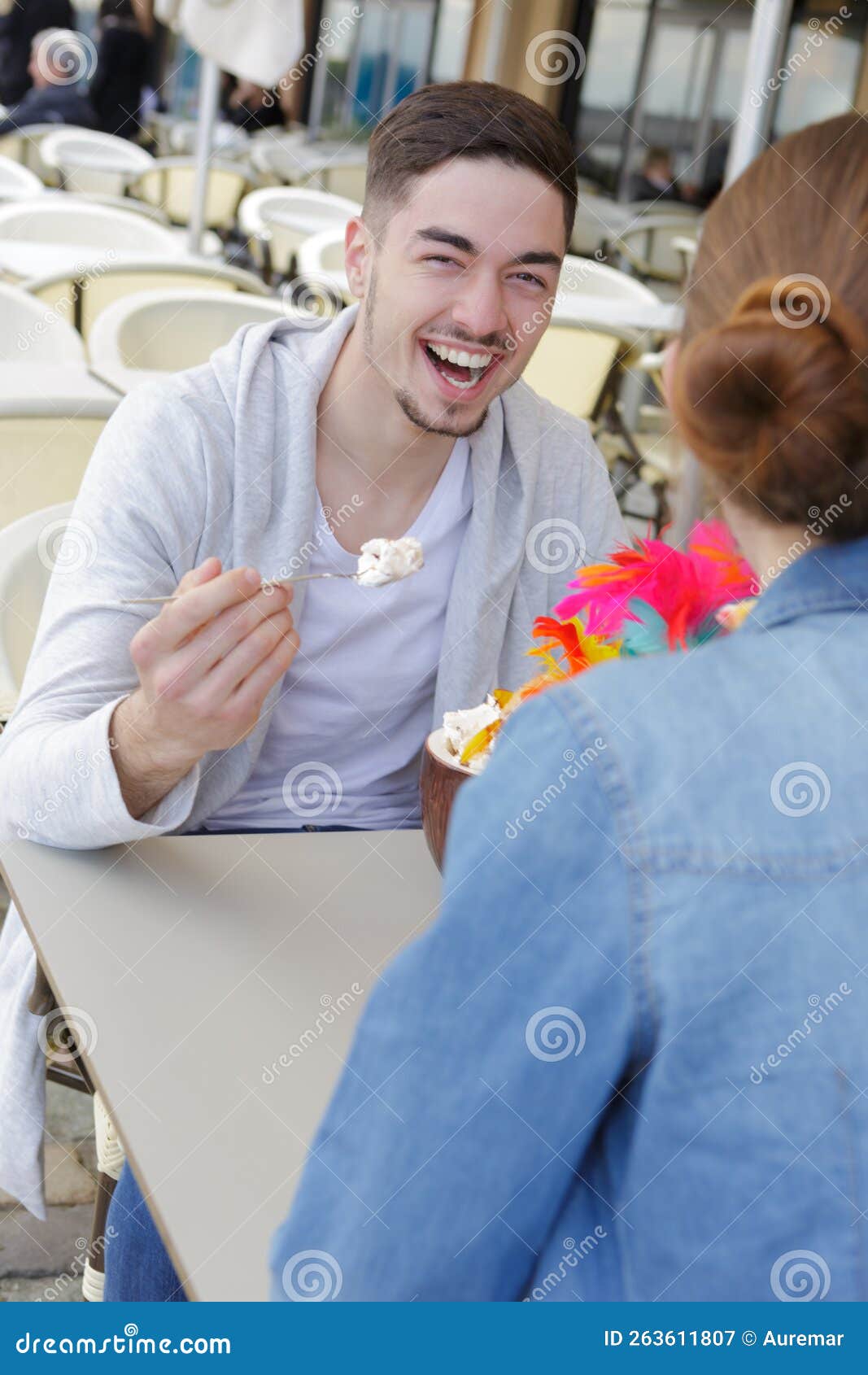 Laughing Young Couple Eating in Cafe Stock Image - Image of laugh, male ...
