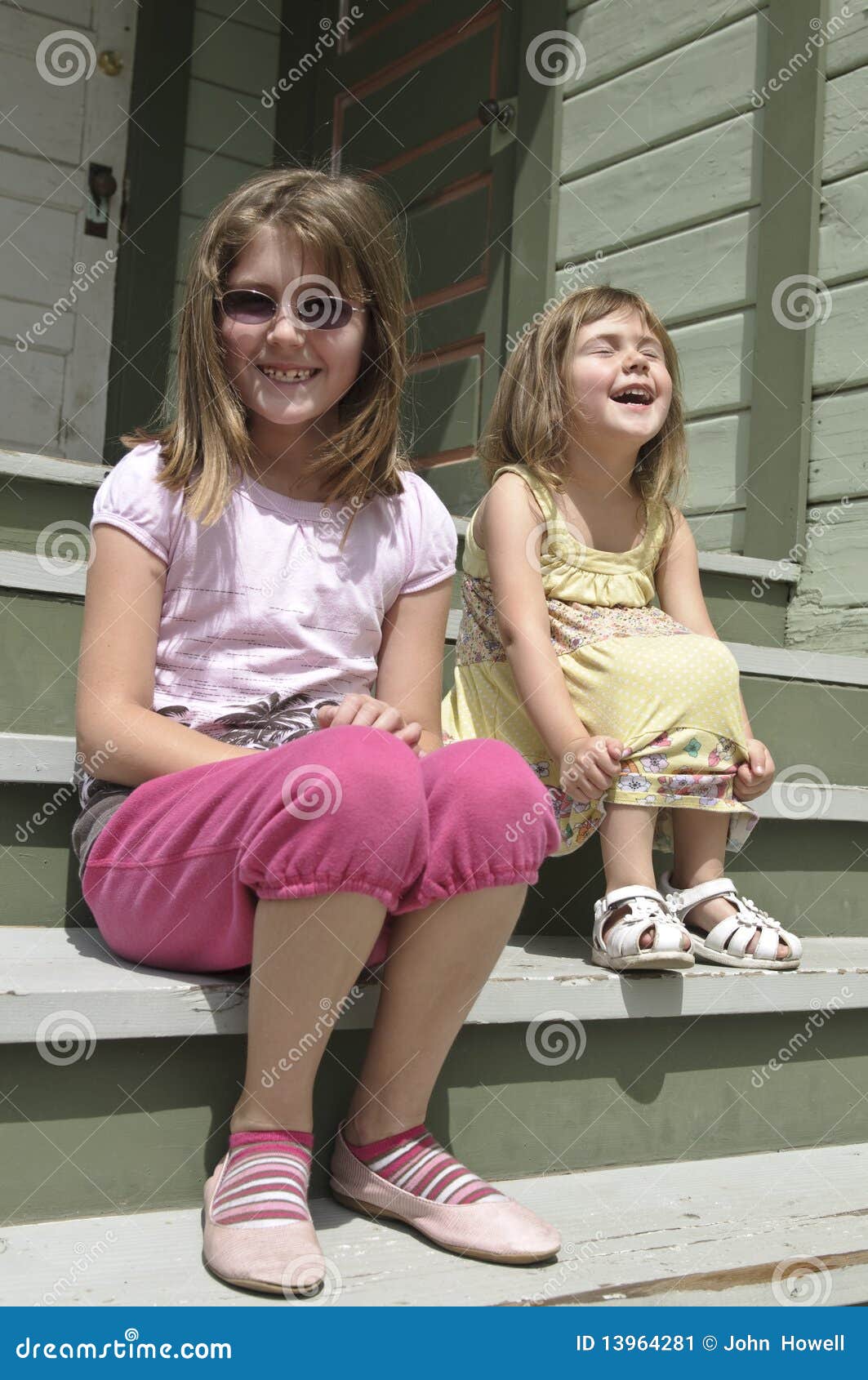 Laughing young sisters stock image. Image of kids, preschool - 13964281