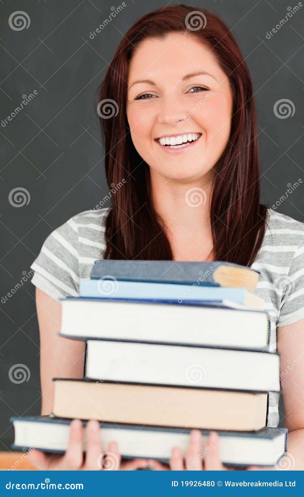 Laughing Young Woman Bringing Books Stock Photo - Image of book ...