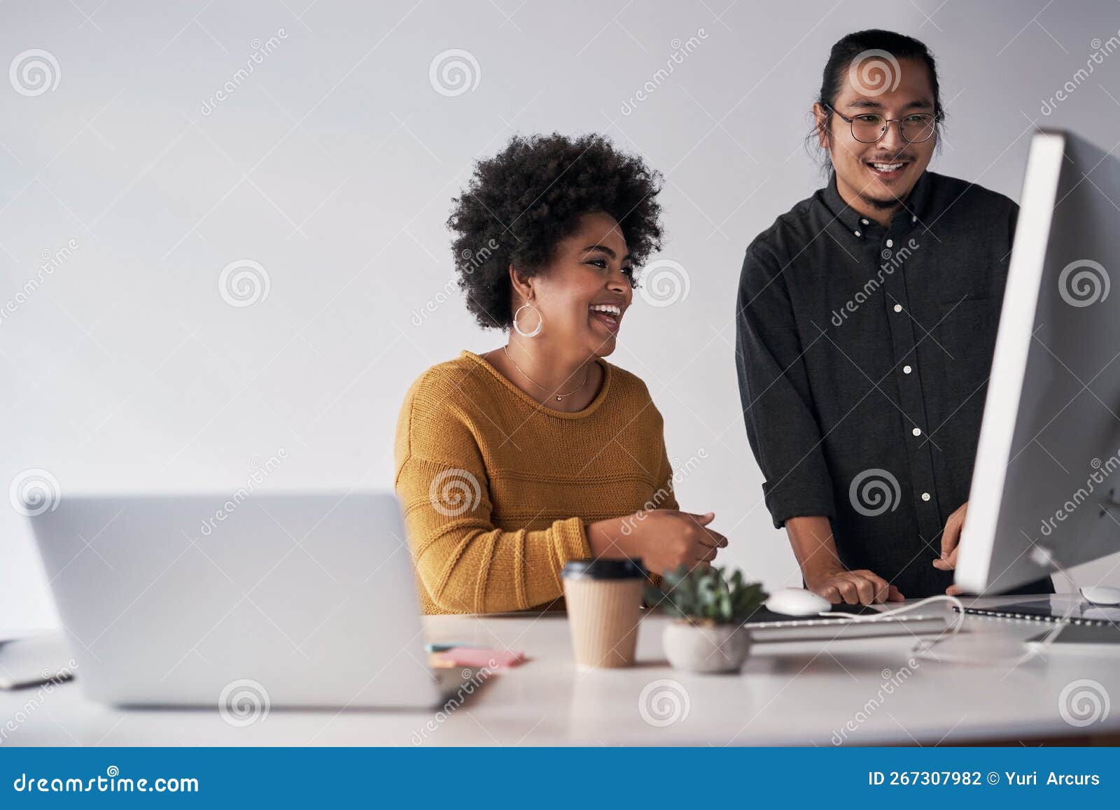 Laughter is Essential for Good Teamwork. a Two Young Coworkers Working ...