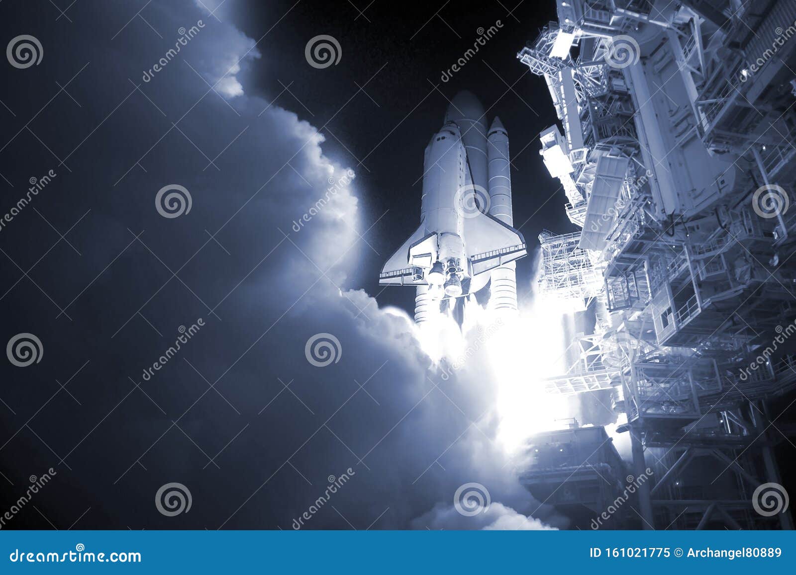 The Launch of a Space Rocket at Night, in Clouds of Smoke. Elements of ...