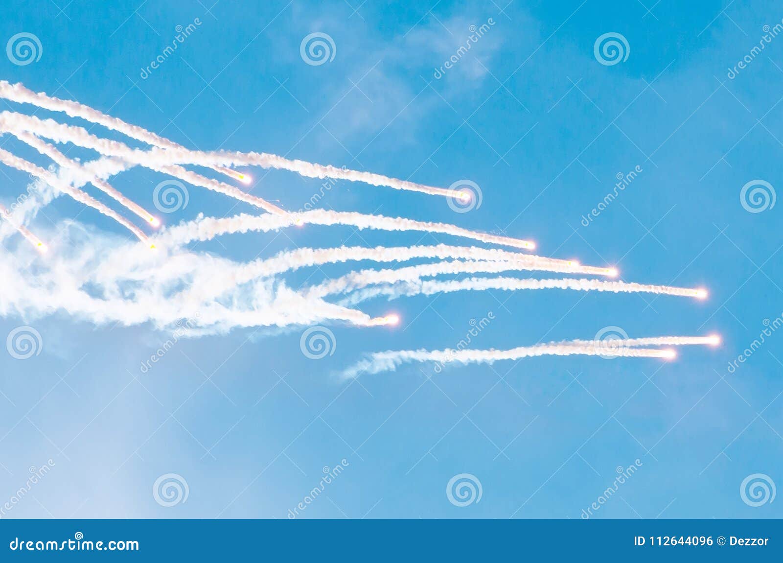 Launching Rockets from the Ground and Burning in the Sky. Stock Photo ...
