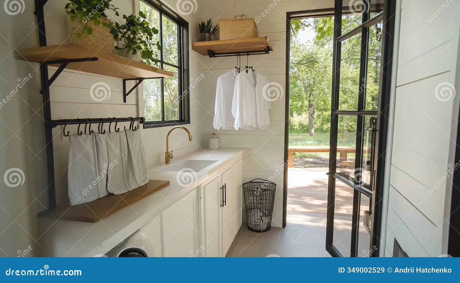 A Laundry Area Featuring Wall-mounted Drying Racks and a Folding ...