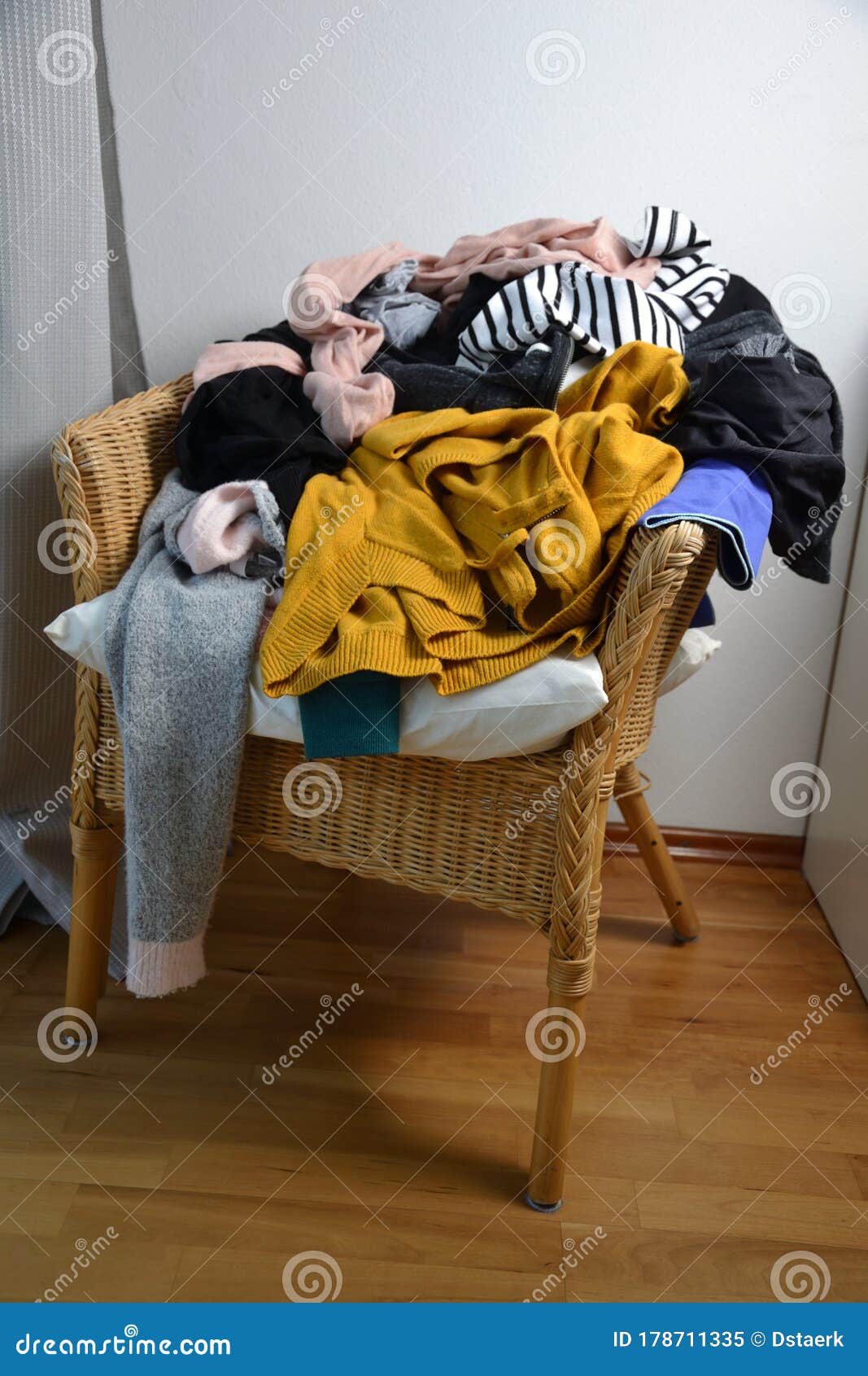 A Laundry Basket Full of Clothes Stock Image - Image of untidy, hanger ...