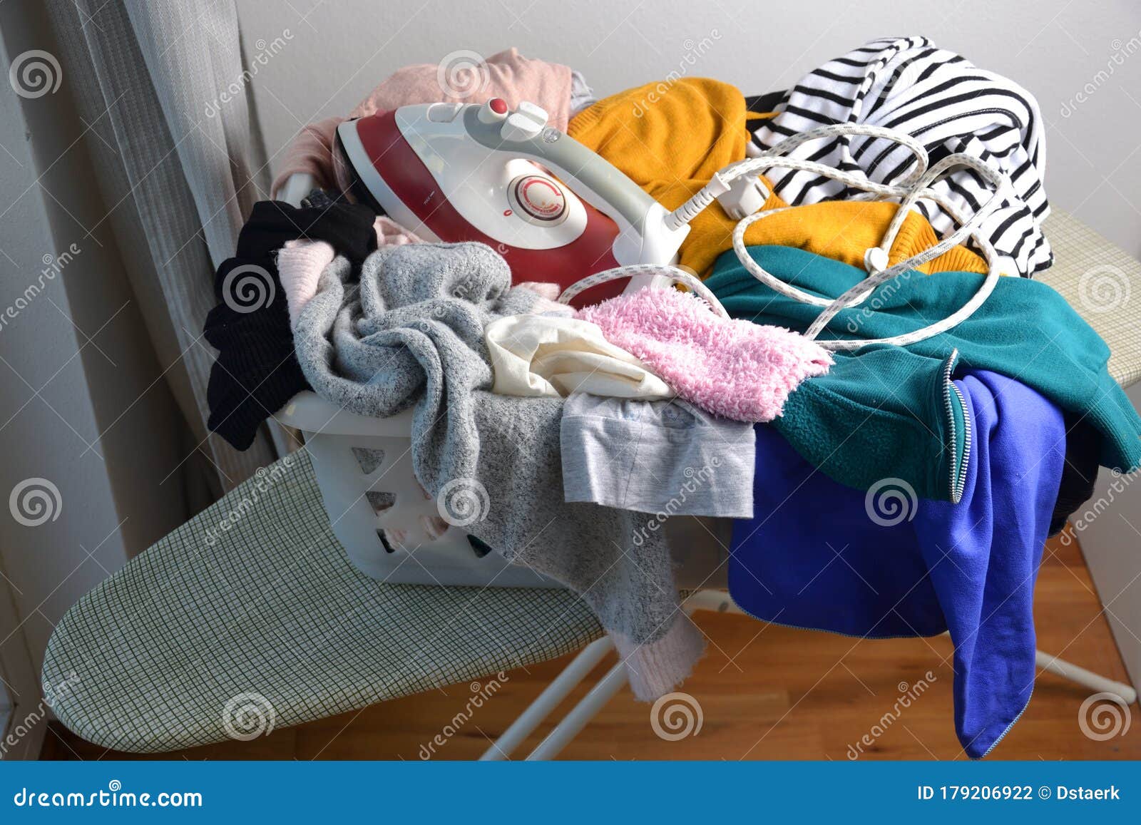 A Laundry Basket Full of Clothes Stock Photo - Image of clothing ...