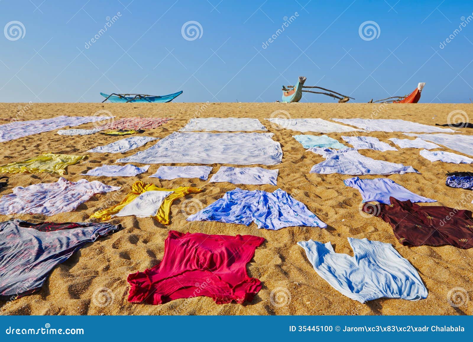 Laundry on the beach stock photo. Image of land, boat - 35445100