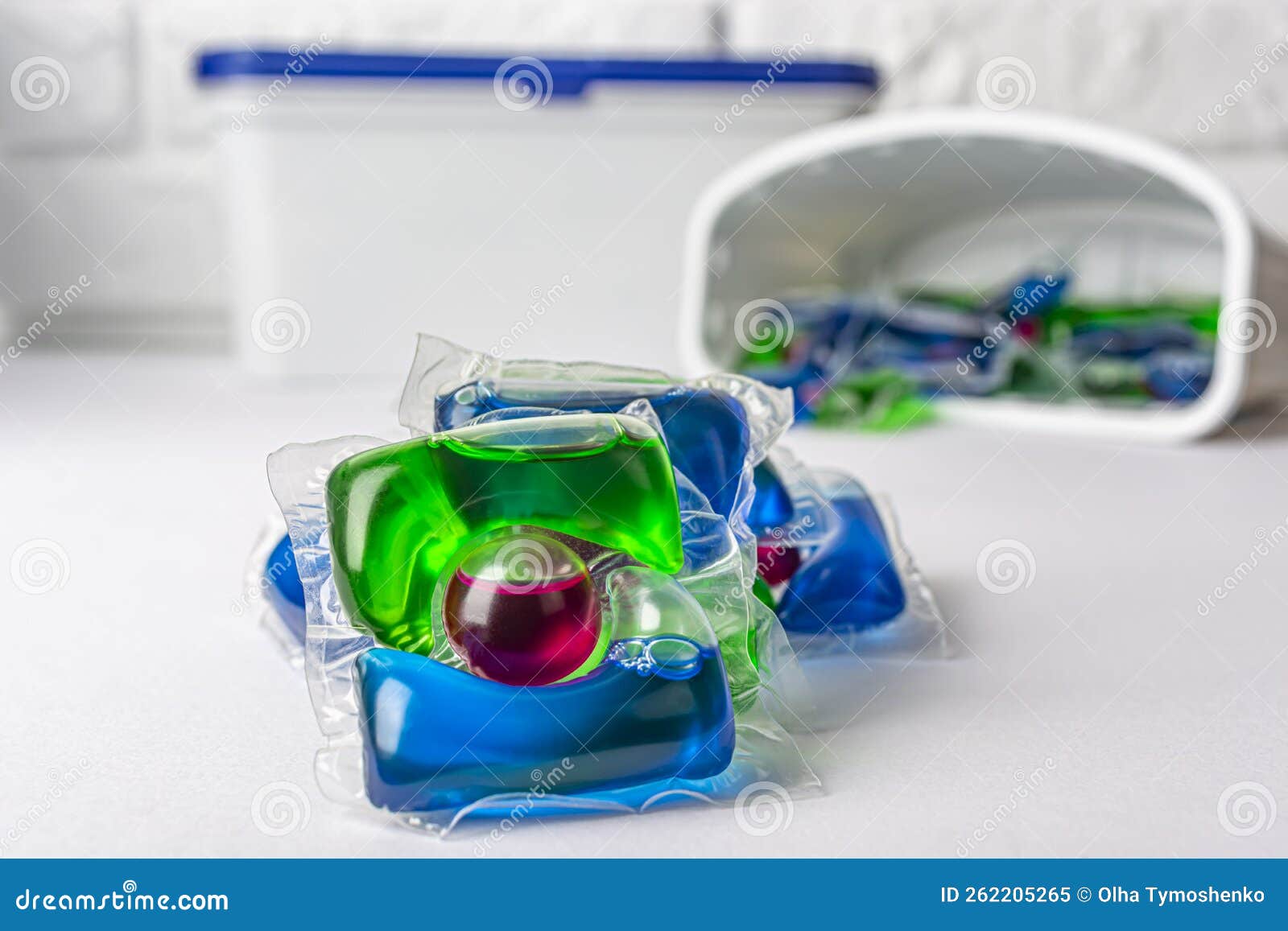 Laundry Capsules and Plastic Containers Isolated on White Background ...