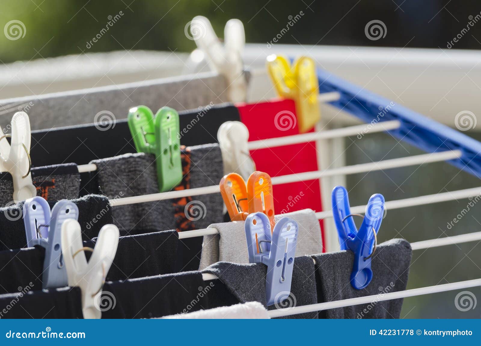 Laundry clips and clothing stock photo. Image of green - 42231778