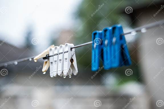 Laundry clips on a string stock photo. Image of green - 63570476