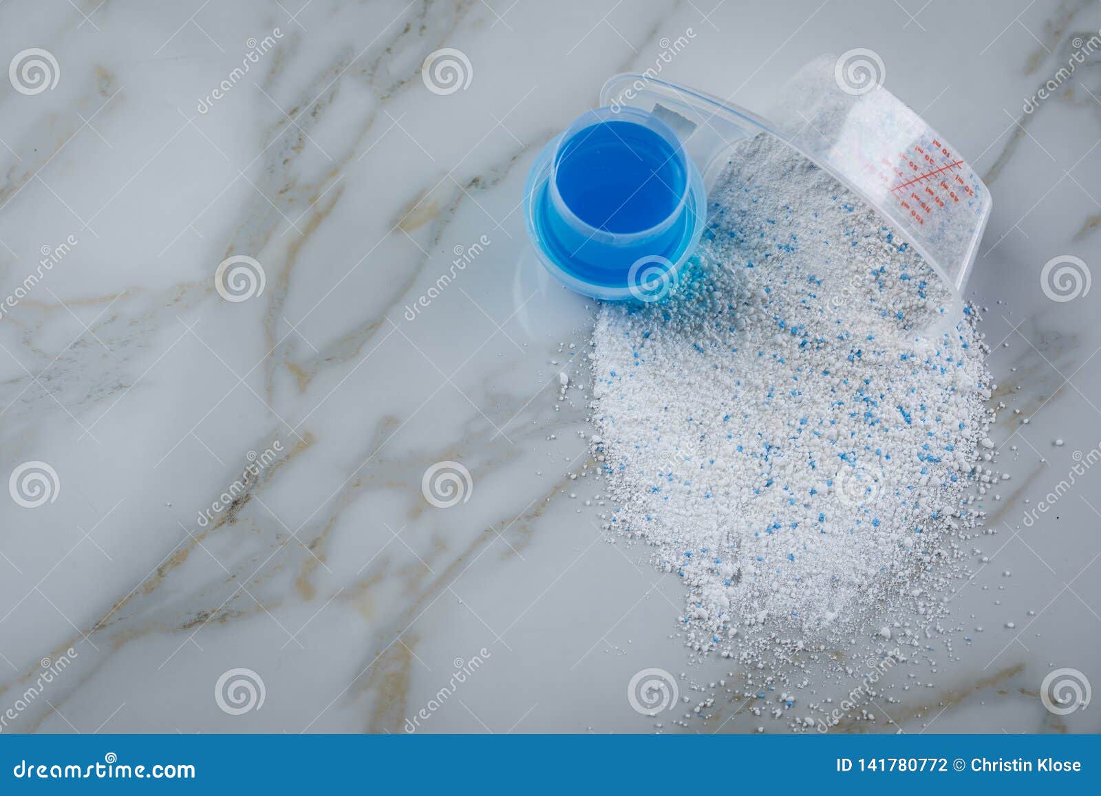 Laundry Detergent Powder and Blue Liquid Gel in Measuring Cup Stock ...