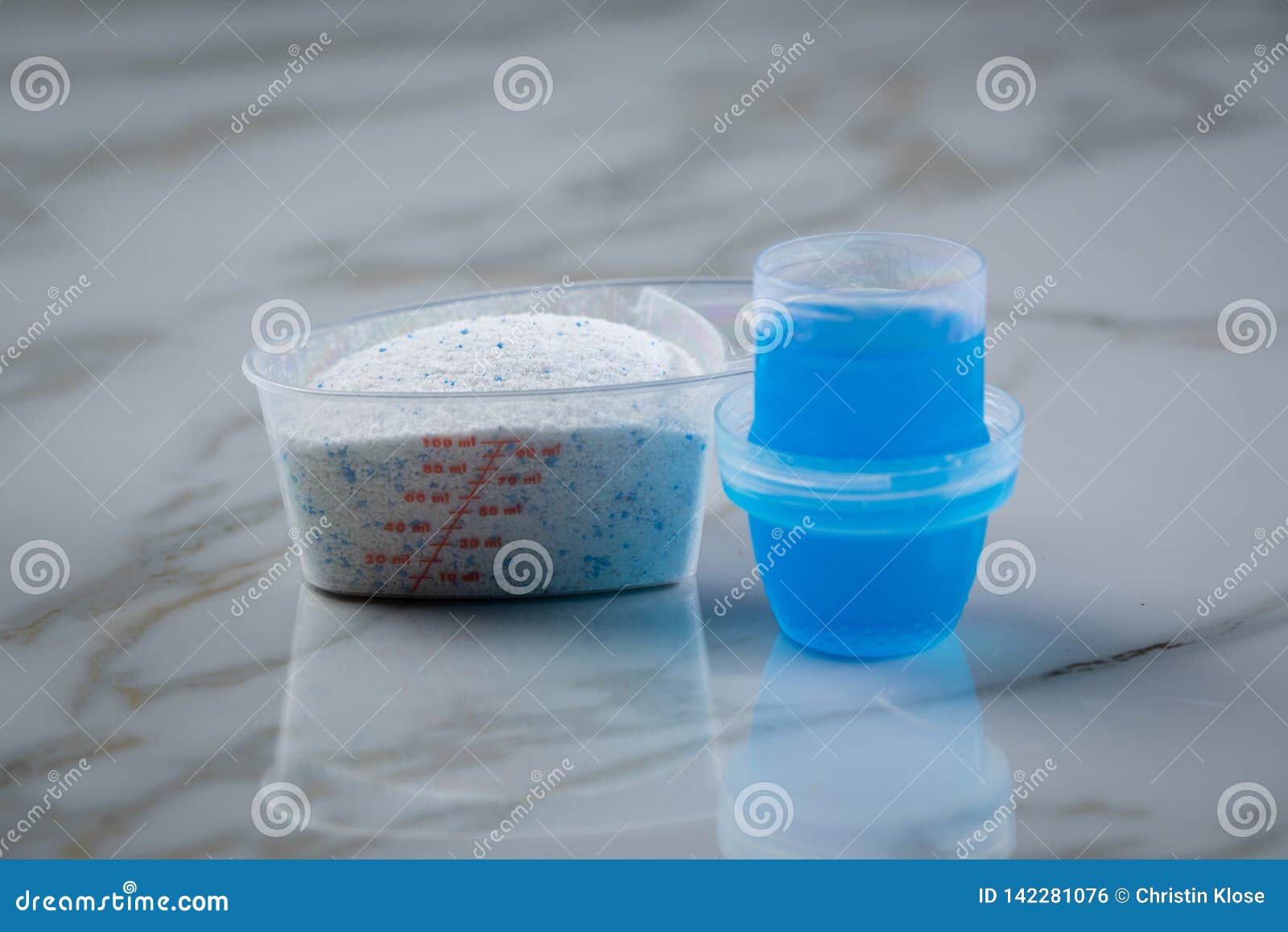 Laundry Detergent Powder and Blue Liquid Gel in Measuring Cup Stock ...