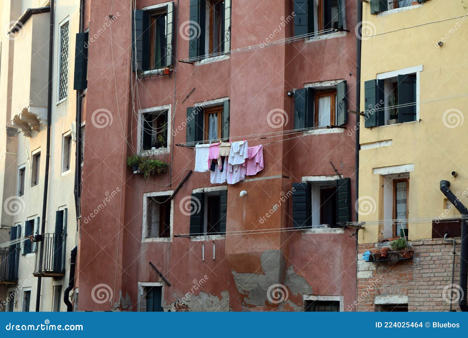 Laundry Hanging on a String between Two Windows in a Building in Venice ...