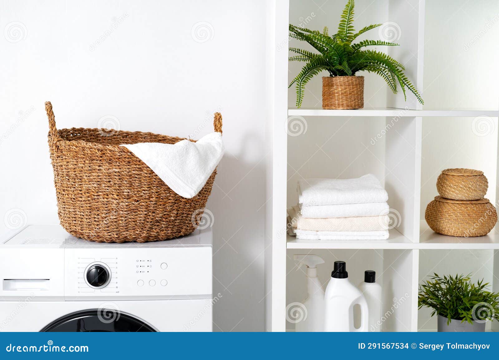 Laundry Room with Washing Machine and Basket with Laundry Stock Photo ...