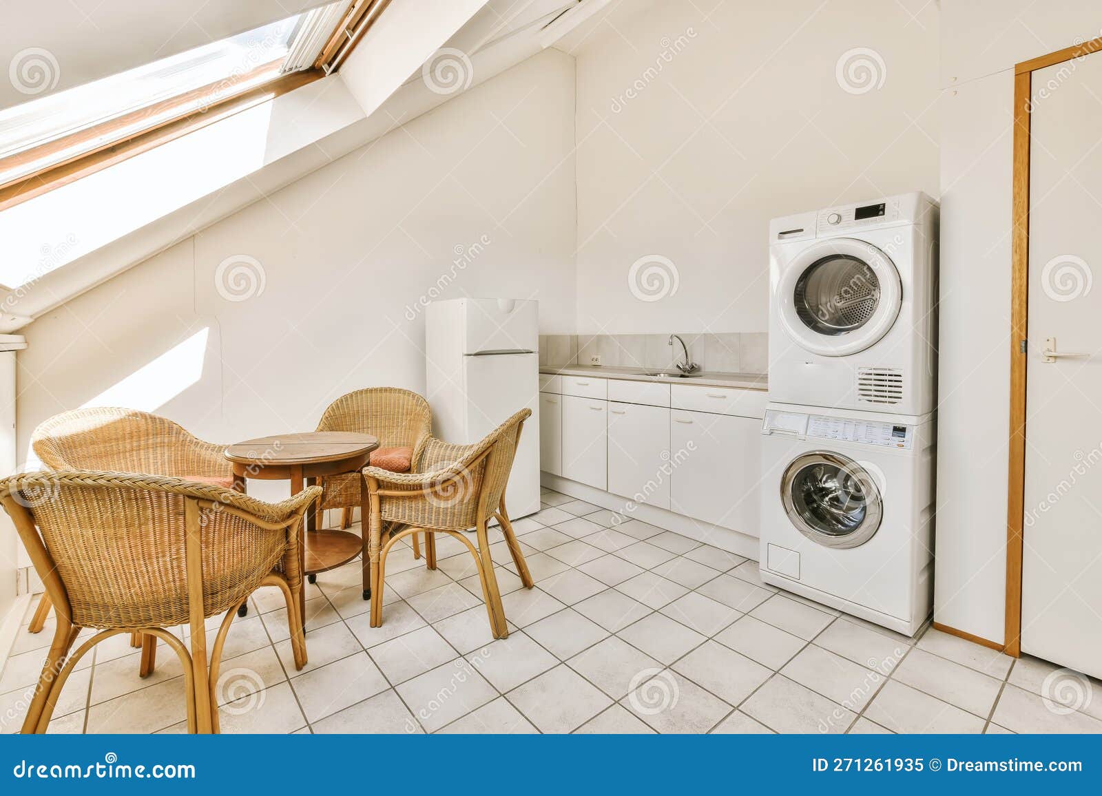 A Laundry Room with a Washing Machine and a Table Stock Image - Image ...