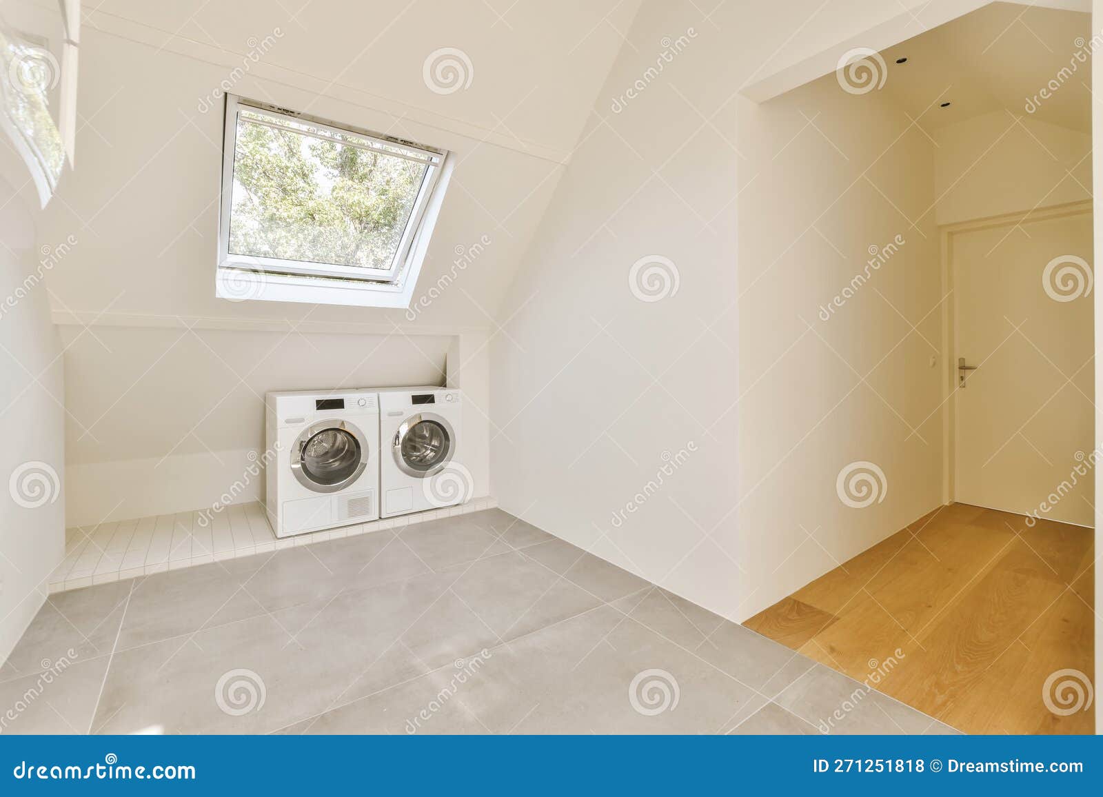 A Laundry Room with a Washing Machine and a Window Stock Photo - Image ...