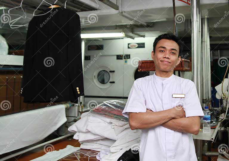 Laundry staff stock photo. Image of service, worker, white - 13079824