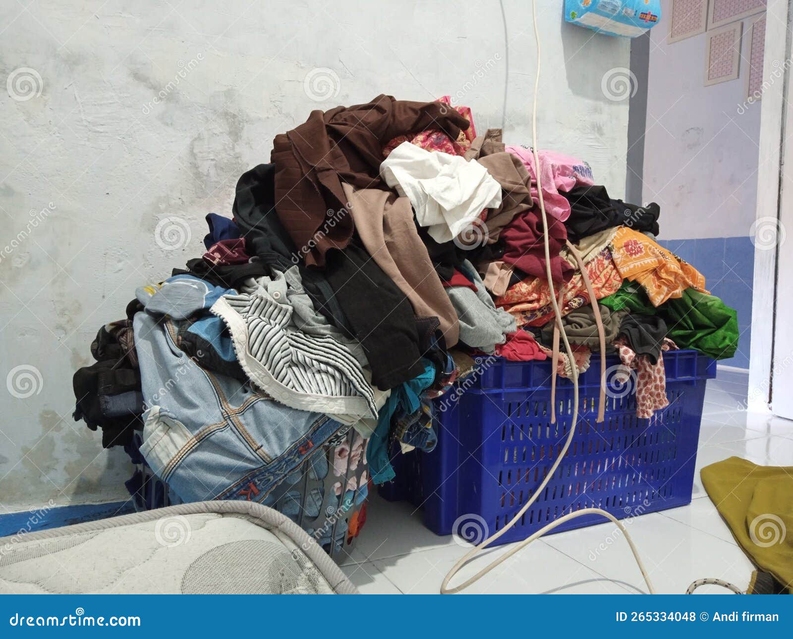 Laundry to be folded stock photo. Image of folded, trousers - 265334048