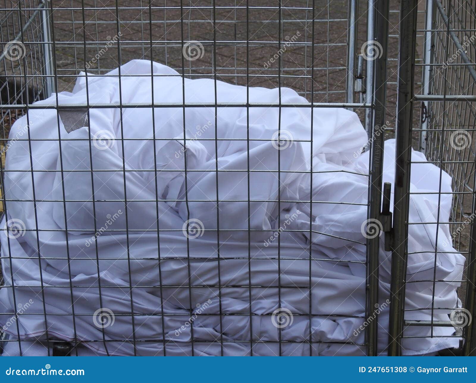 Laundry Trolley Filled with Sheets Stock Photo - Image of linin ...