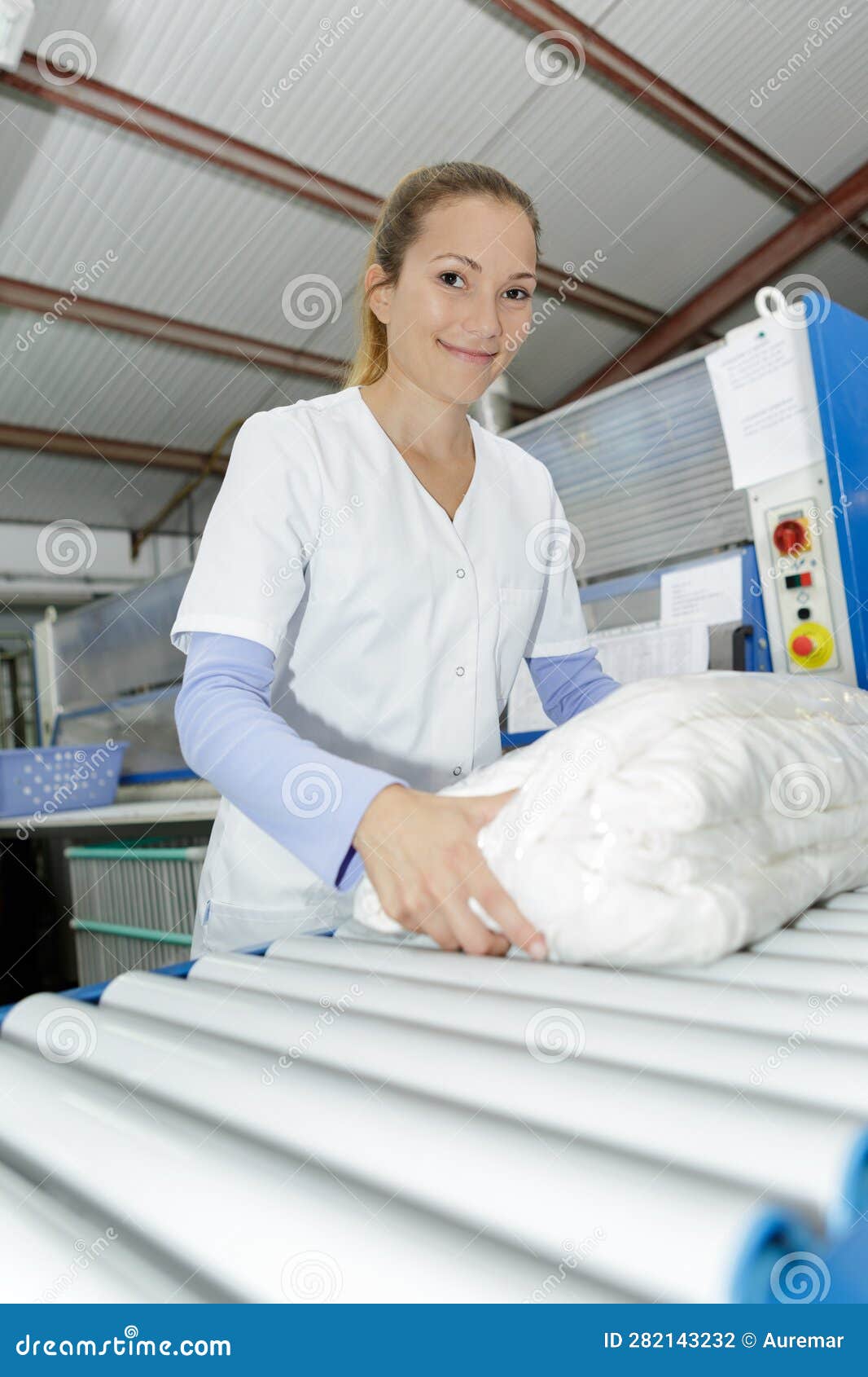 Laundry Worker at Dry Cleaners Stock Photo - Image of press, textile ...