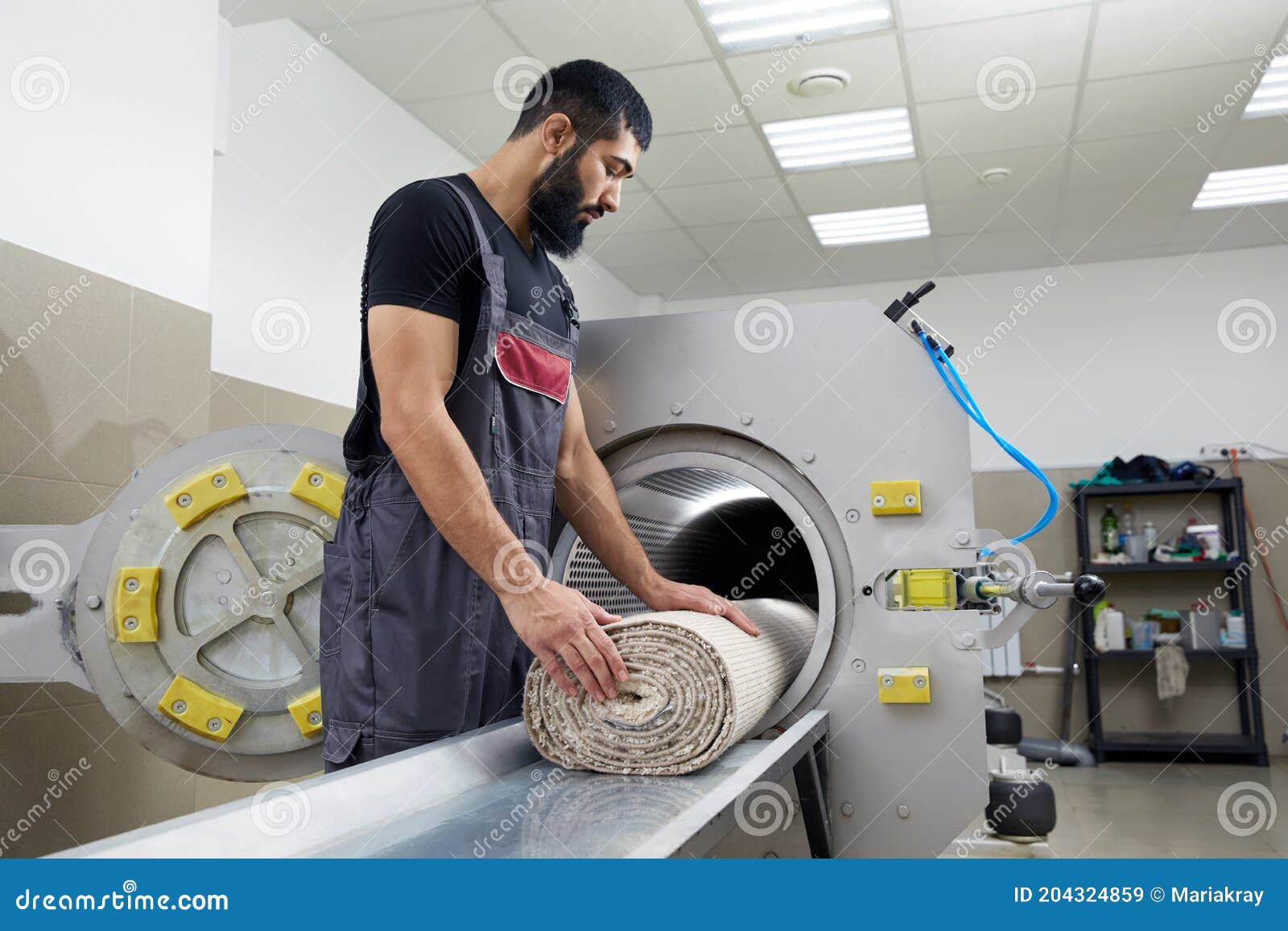 Man Operating Drying Machine for Carpet Cleaning. Professional Carpet ...