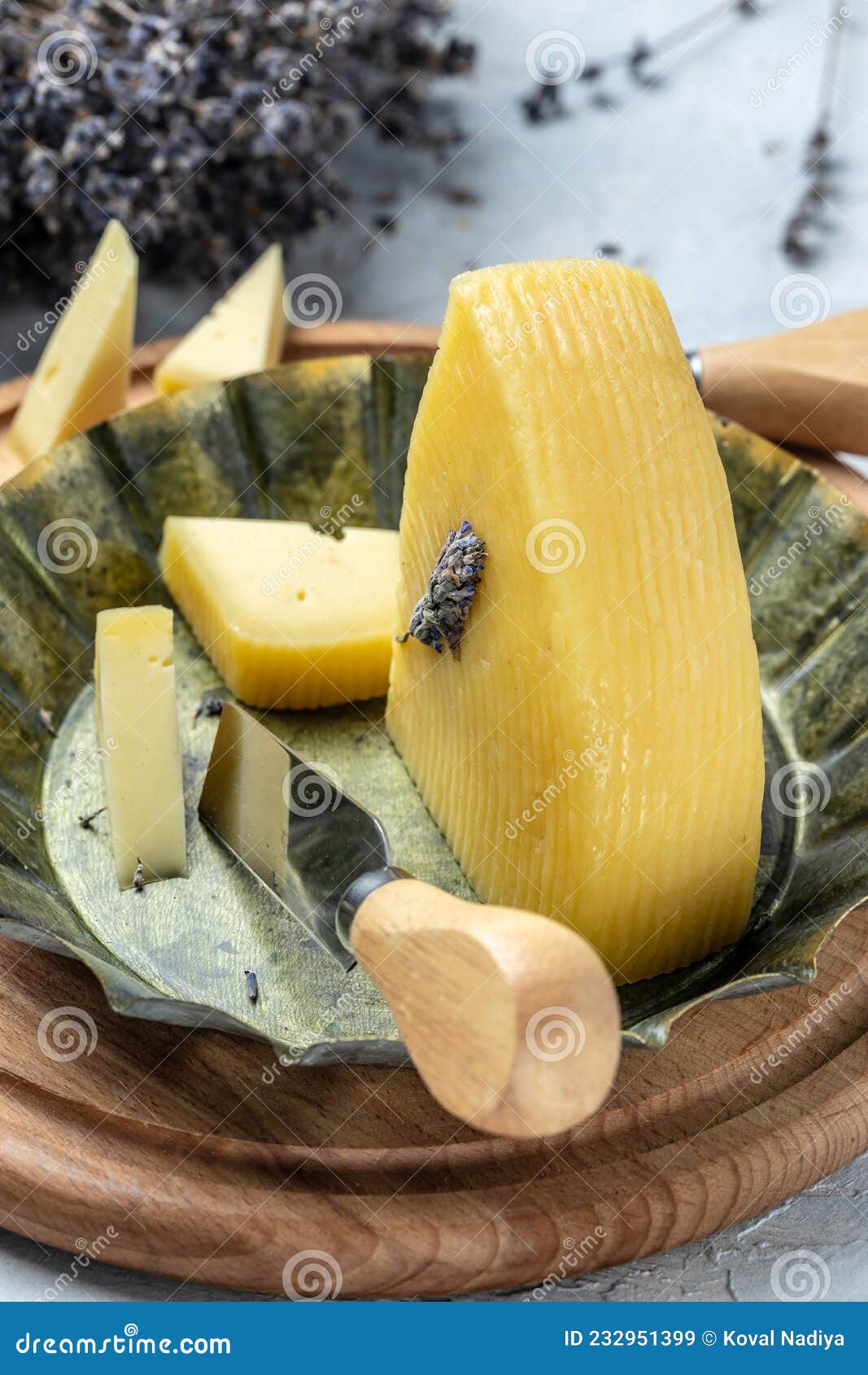 Lavender Cheese with Dry Lavender Flowers on Tray. Lavender Cheddar ...
