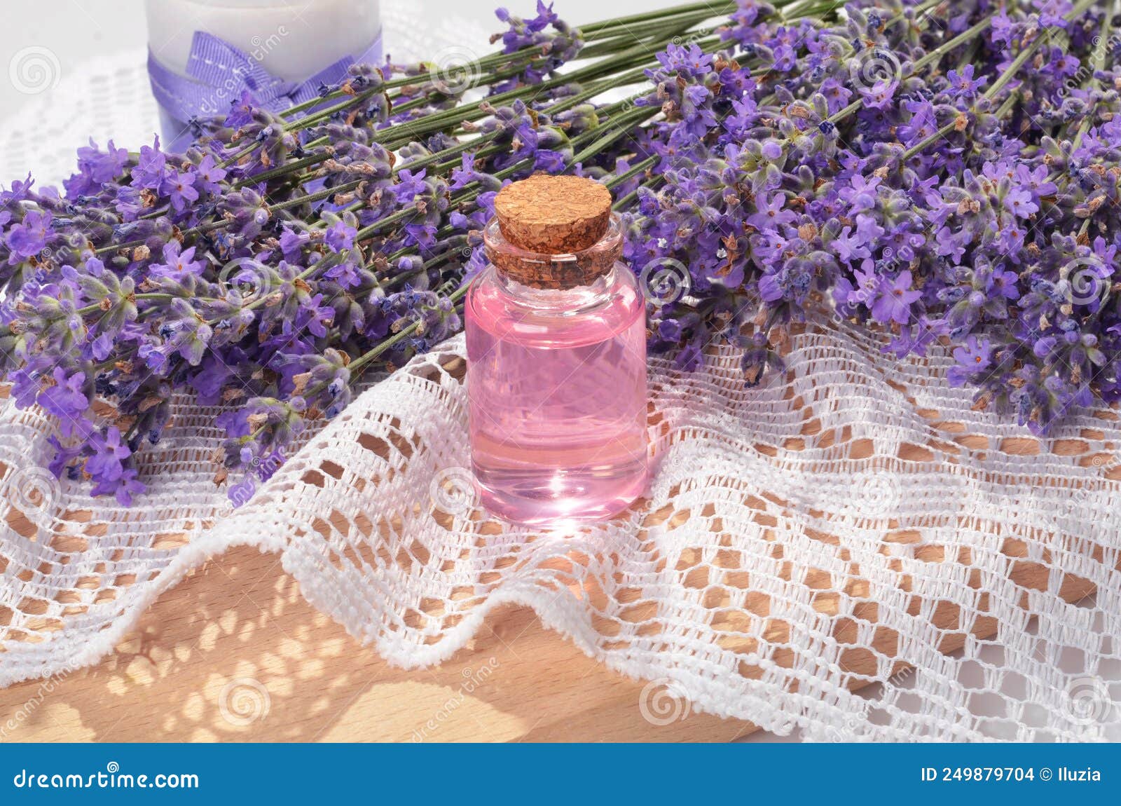 Lavender Water in a Bottle, a Bouquet of Fresh Lavender on a Table with ...
