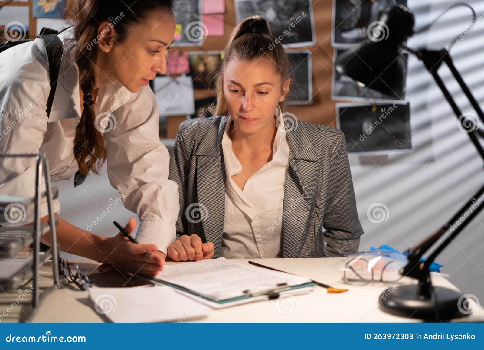 Law Enforcement Office Partners Solving the Crime Working in Office ...