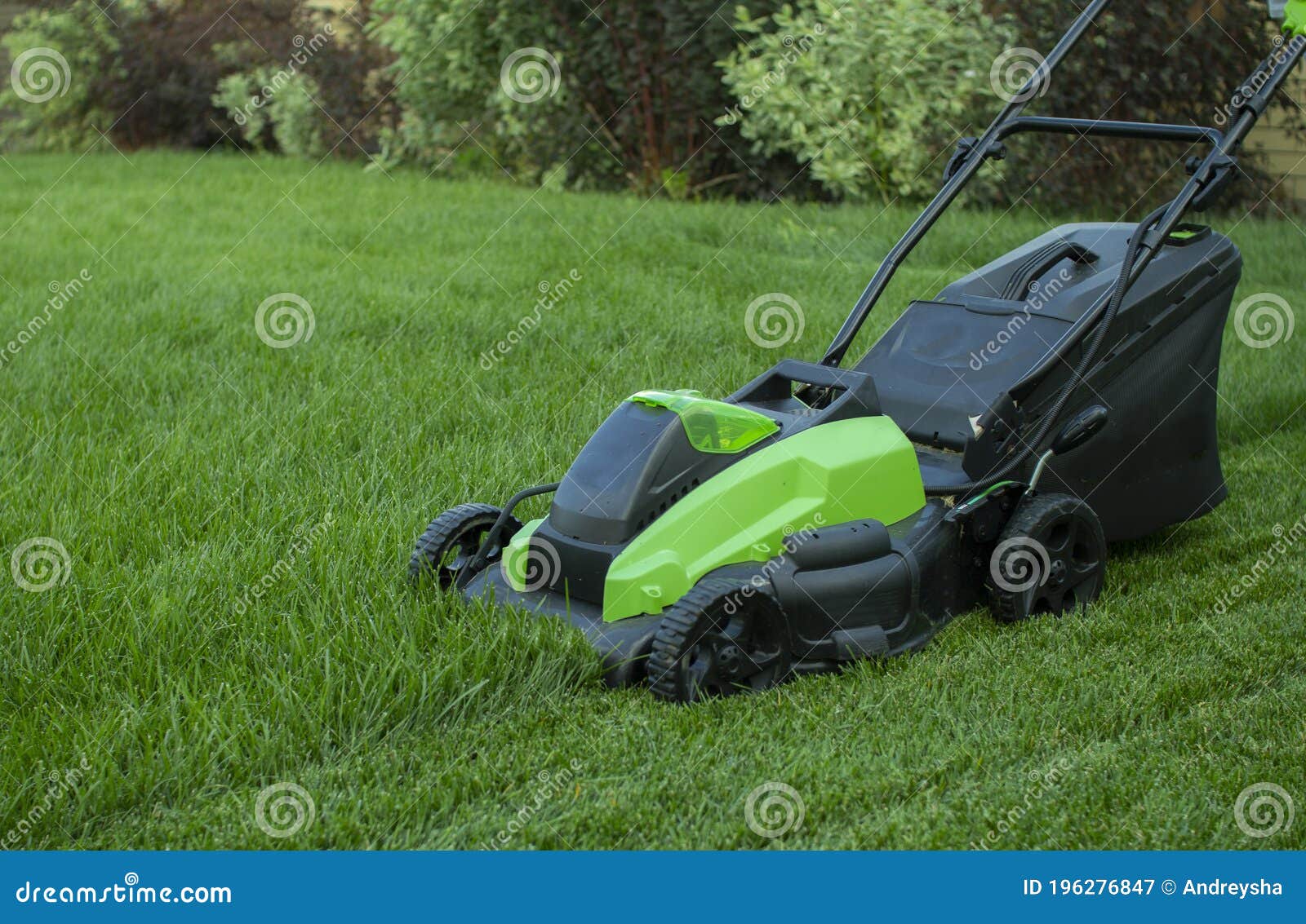 Lawn Mower on a Green Lawn. Stock Image - Image of engine, push: 196276847