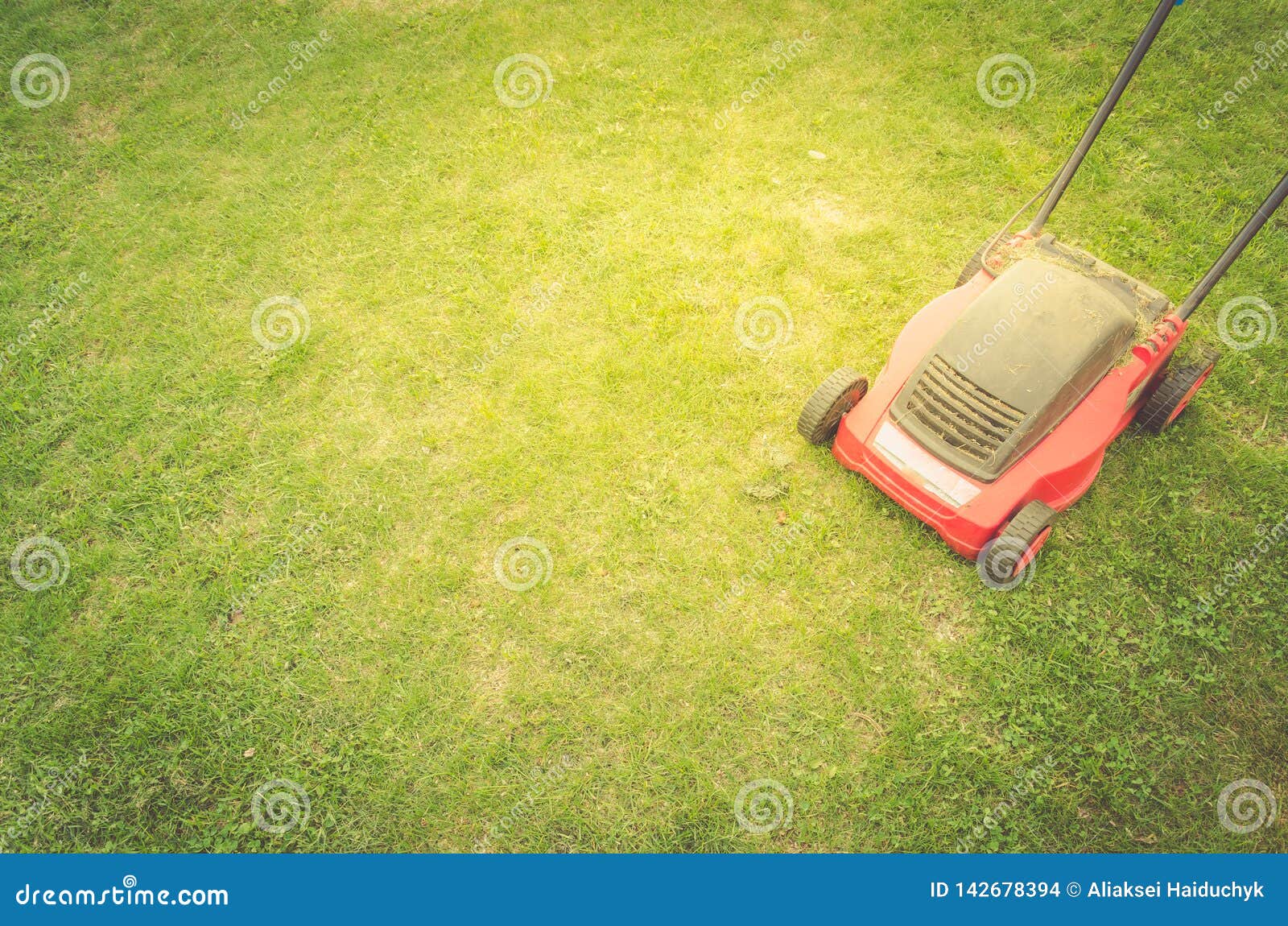 Lawn Mower on a Green Lawn/lawn Mower on a Green Lawn. Top View and ...
