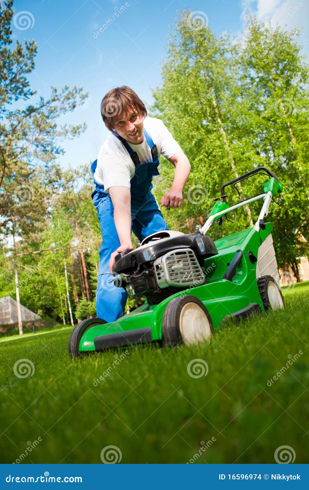Lawn mower man stock photo. Image of petrol, lawnmower - 16596974