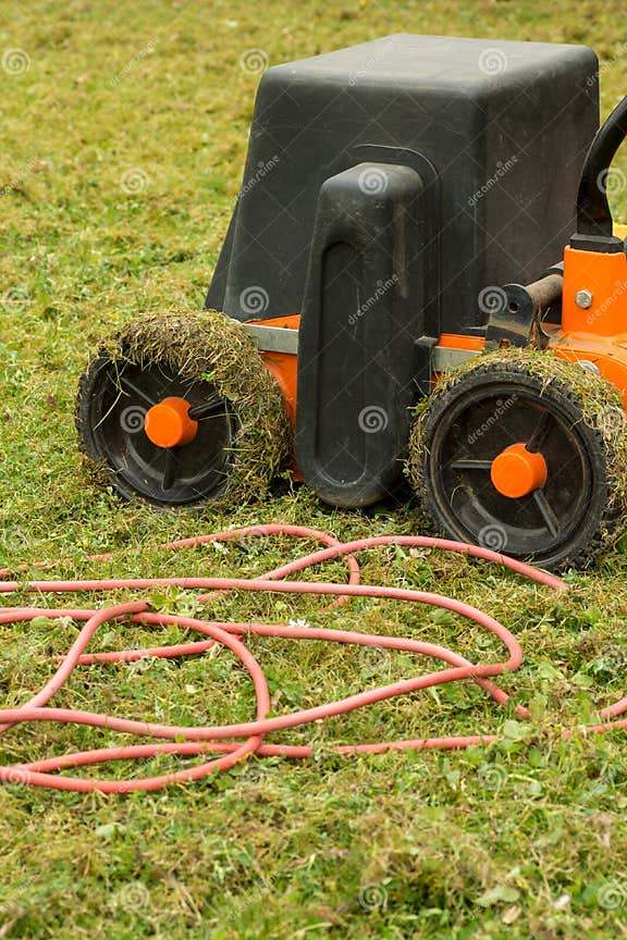 Lawn thatcher stock image. Image of garden, farming, machine - 53735225