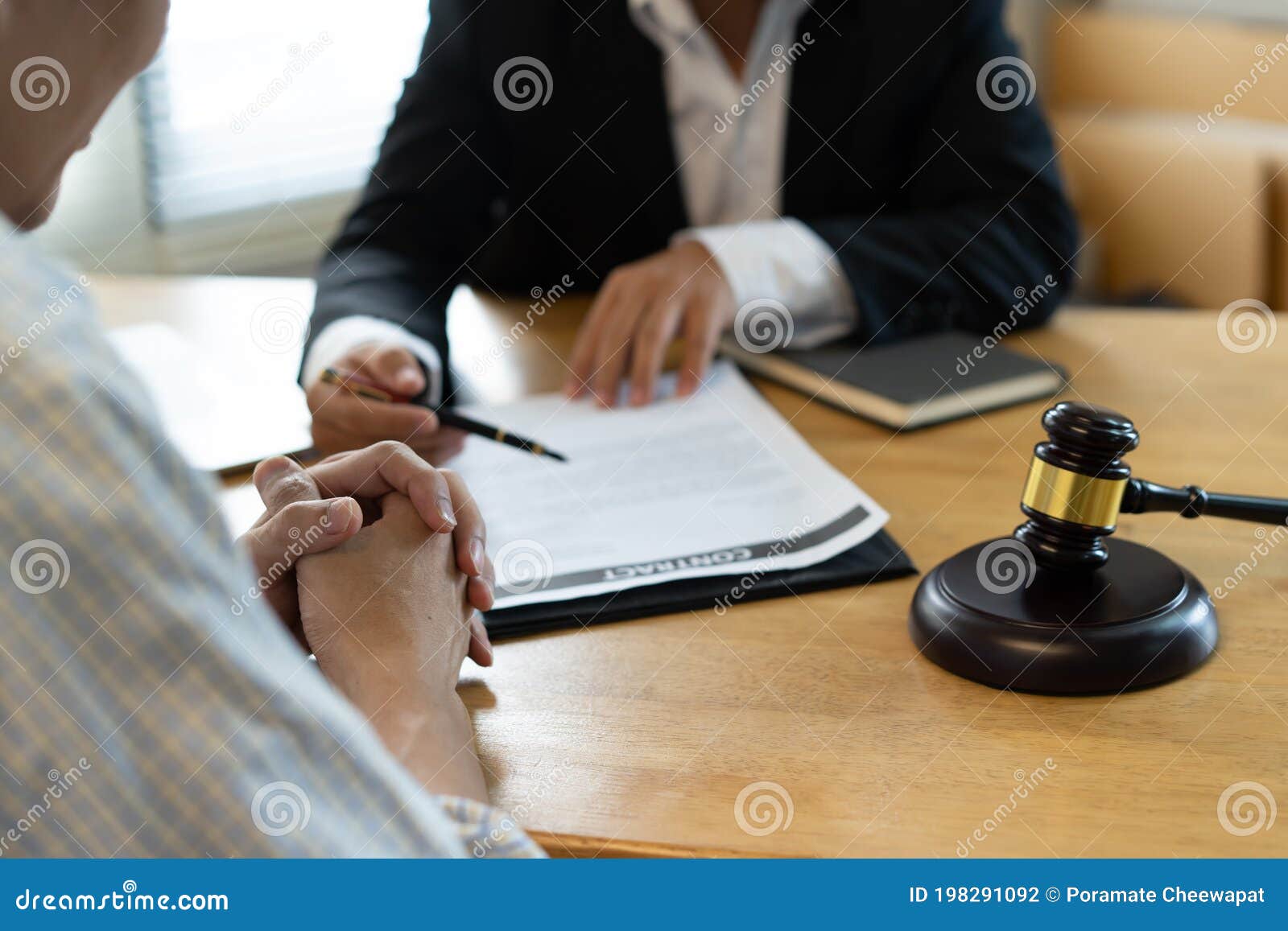 Lawyer Consulting To Client before Sign Business Contract in the Office ...