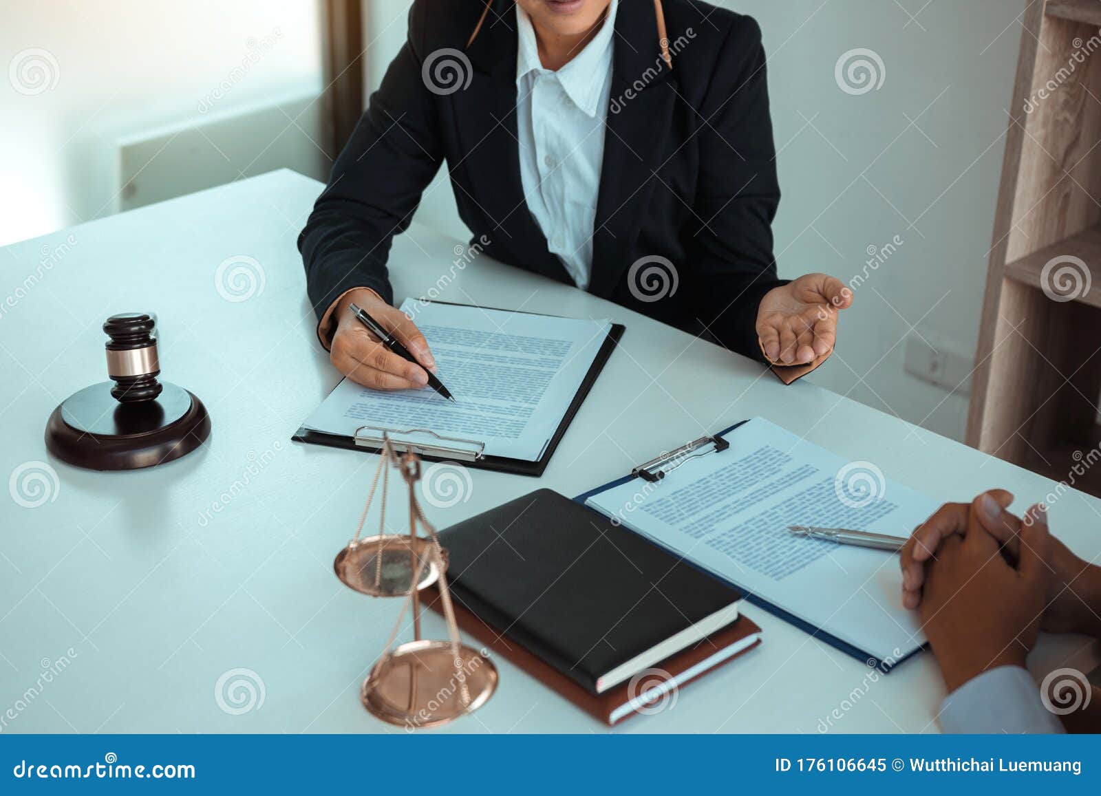 Lawyer is Explaining about the Wrongdoing Laws Regarding Fraud To the ...