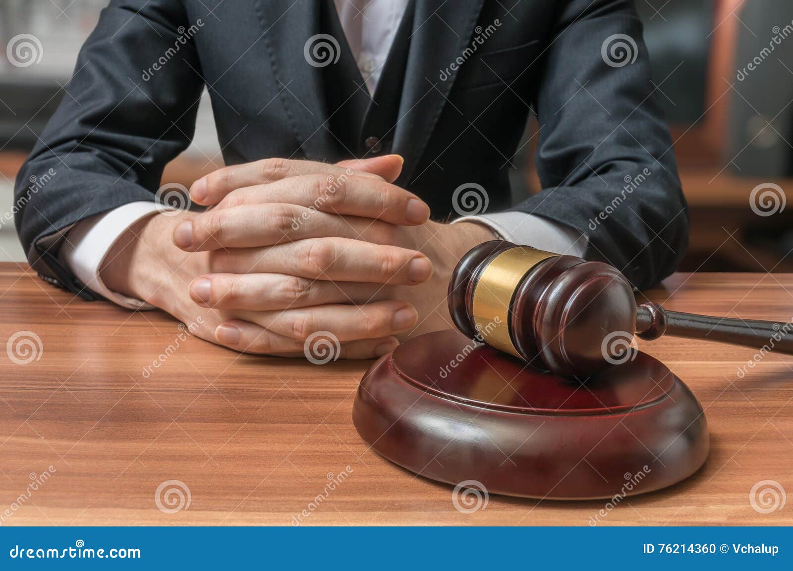Lawyer Has Clasped Hands and Gavel in Front. Justice and Law Concept ...