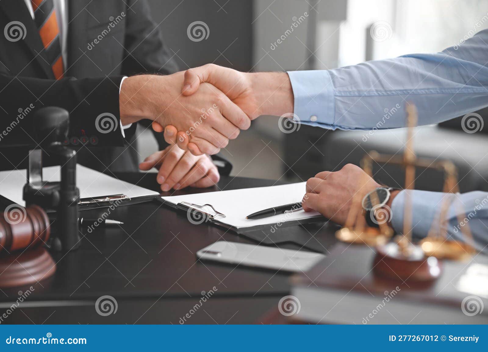 Male Lawyer with Client Shaking Hands in Office Stock Photo - Image of ...