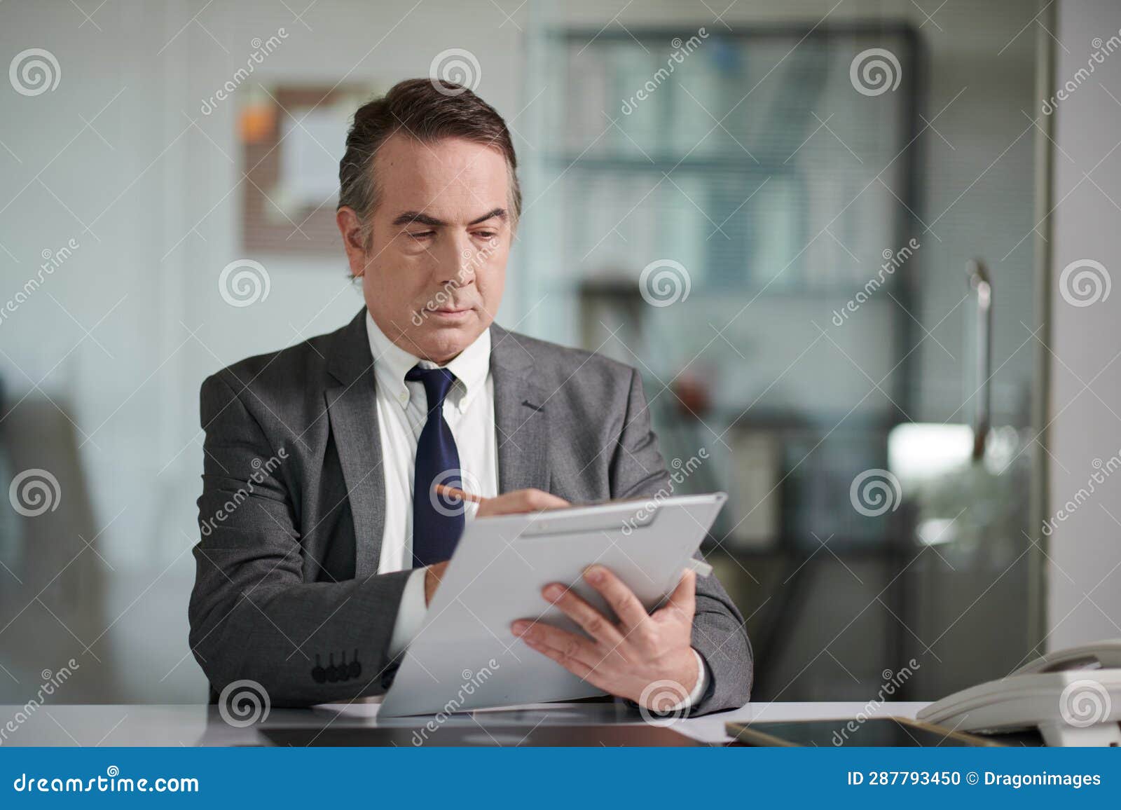 Lawyer Reading Case Papers stock photo. Image of table - 287793450