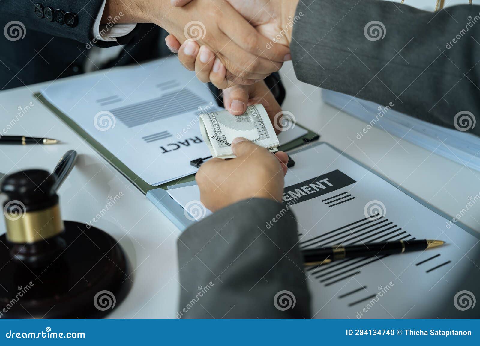 Lawyer Shaking Hands with Client after Discussing Final Contract ...