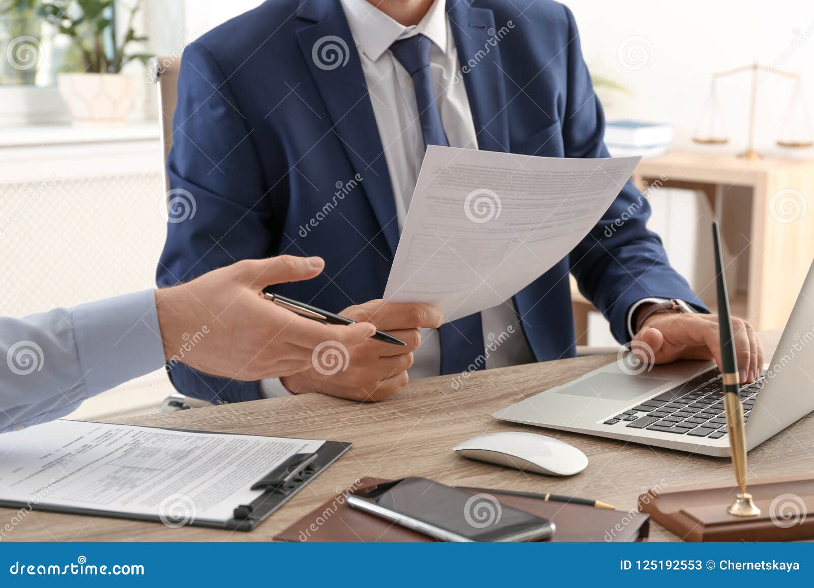 Lawyer Working with Client at Table in Office, Focus Stock Image ...