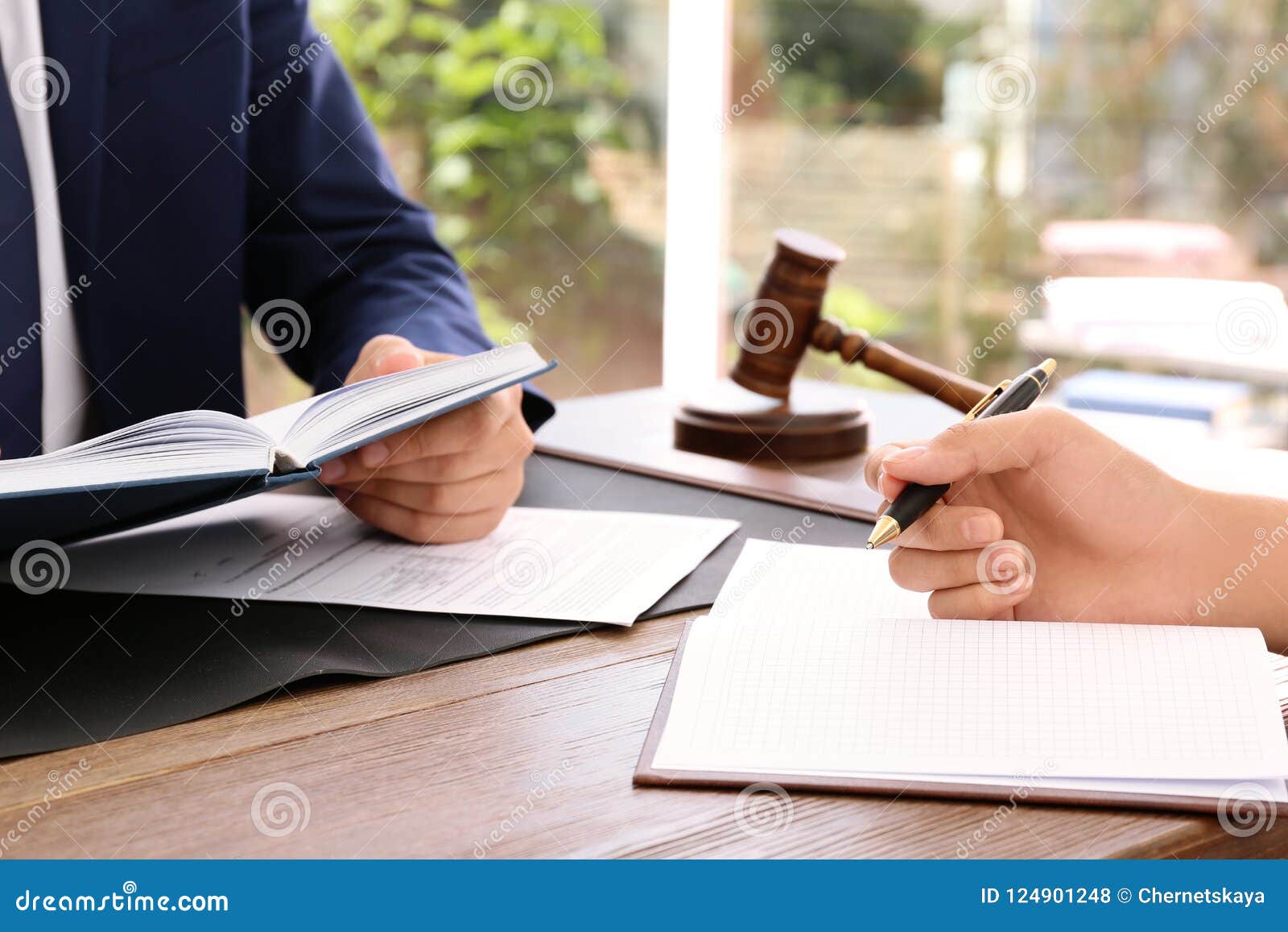 Lawyer Working with Client at Table in Office Stock Photo - Image of ...