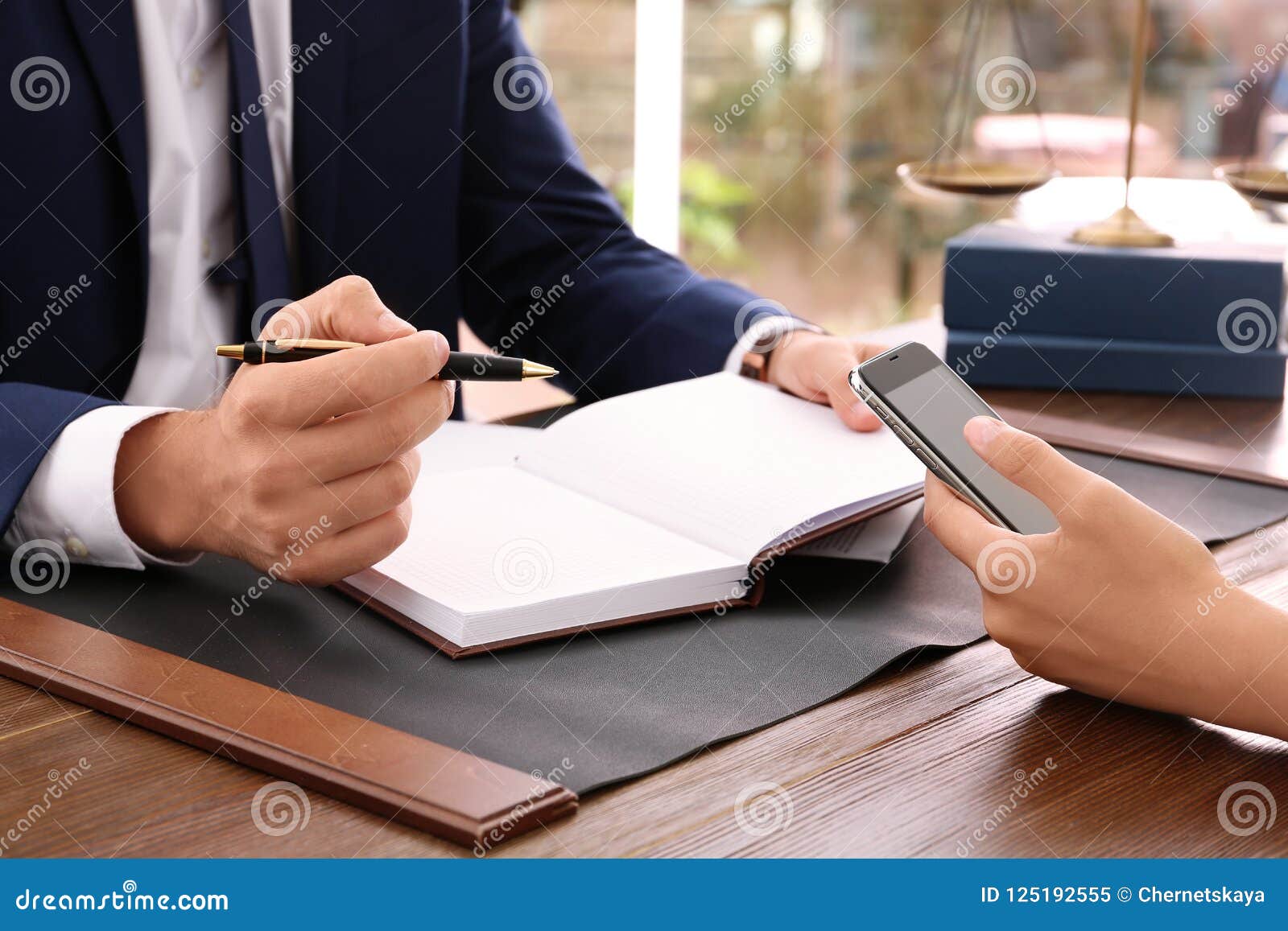 Lawyer Working with Client at Table in Office Stock Image - Image of ...