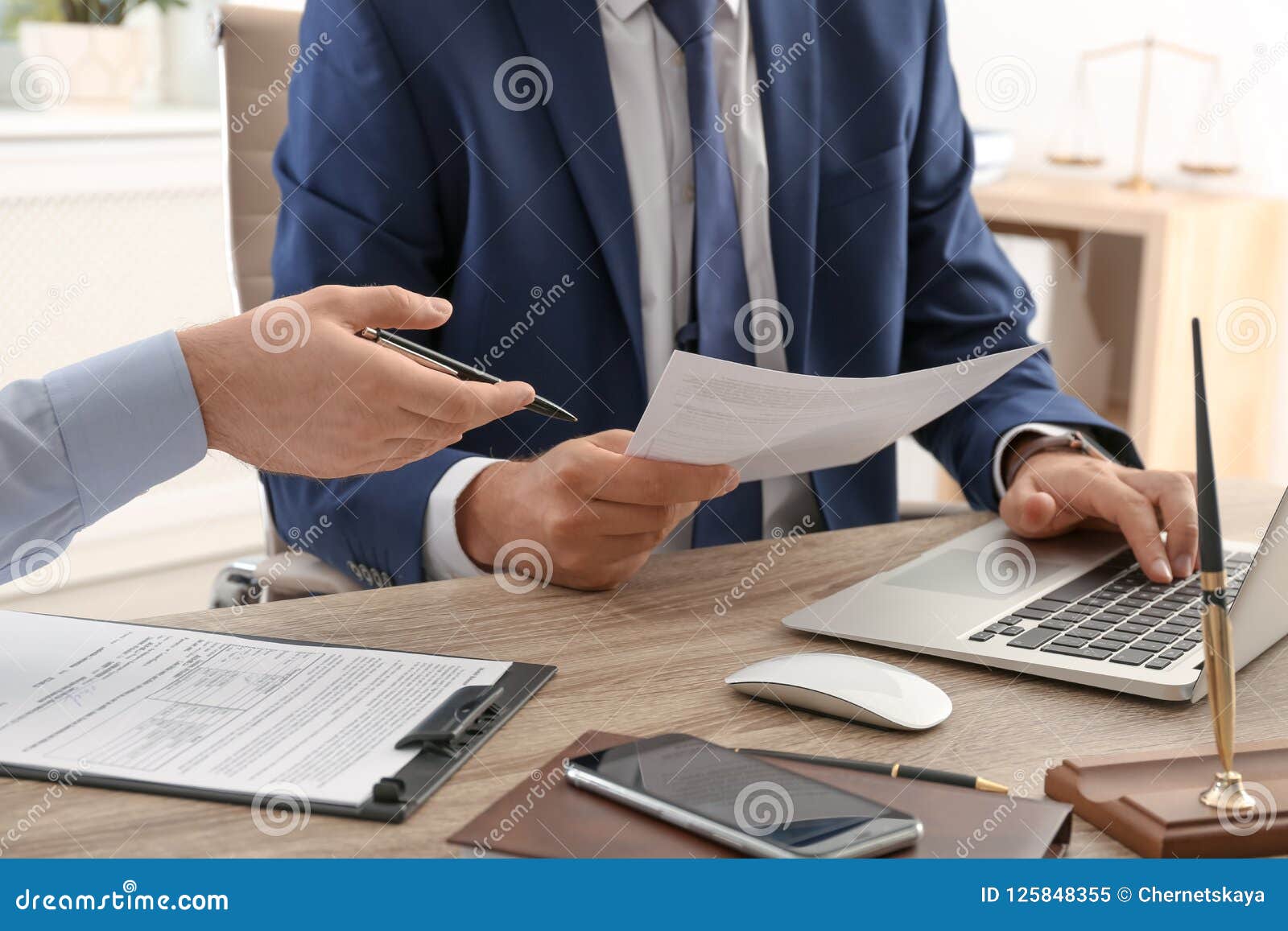Lawyer Working with Client at Table in Office, Stock Image - Image of ...