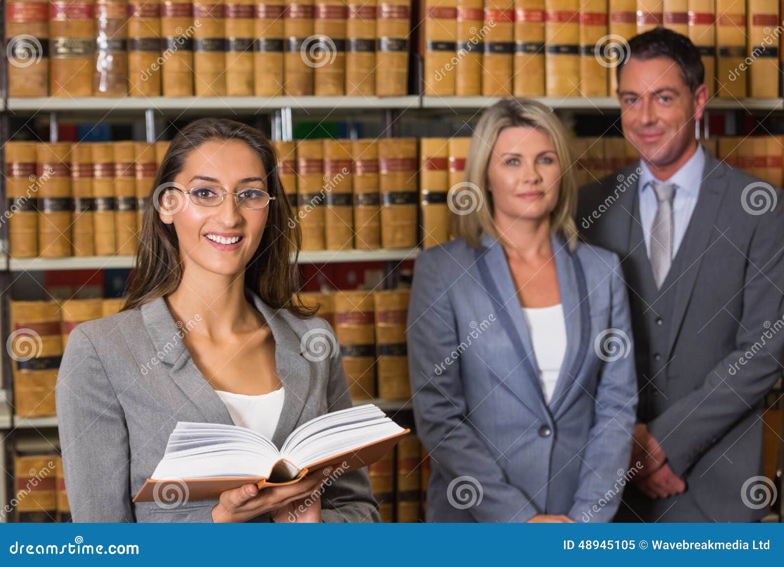 Lawyers in the law library stock image. Image of bookshelf - 48945105