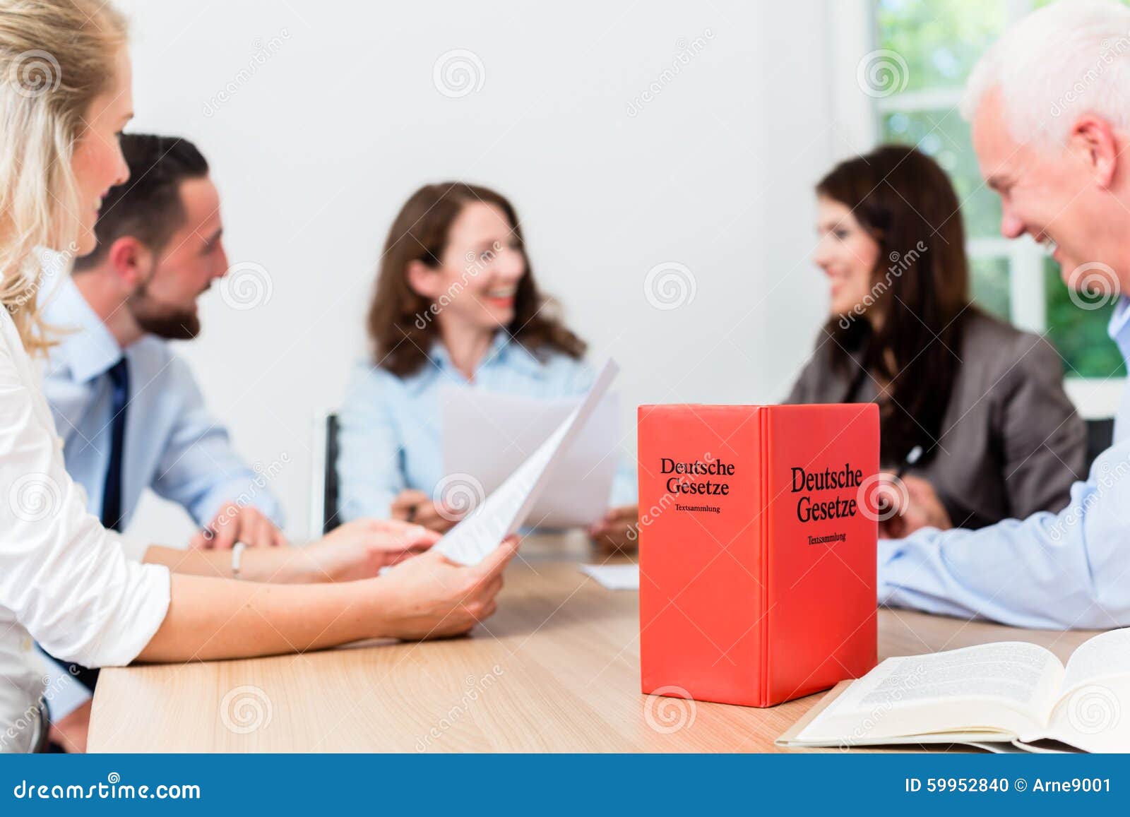 Lawyers in Meeting Negotiating Agreement Stock Photo - Image of book ...