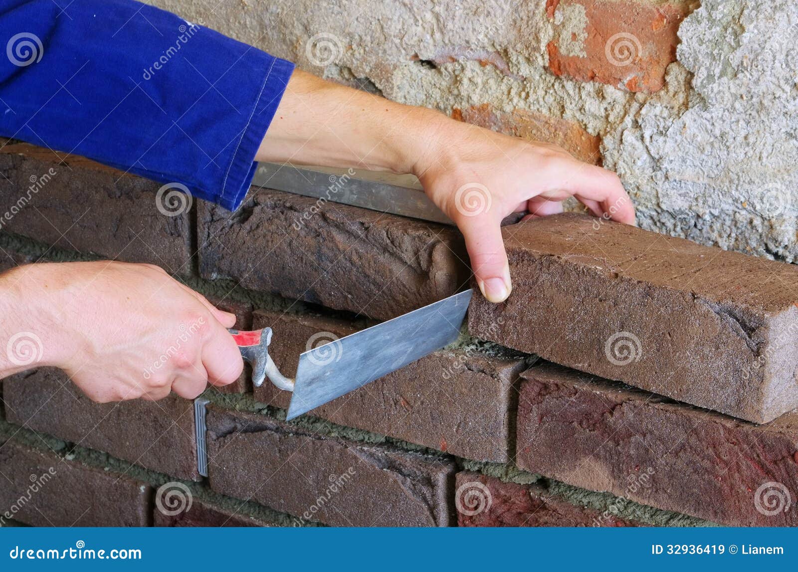 Lay a brick wall stock image. Image of tool, construction - 32936419