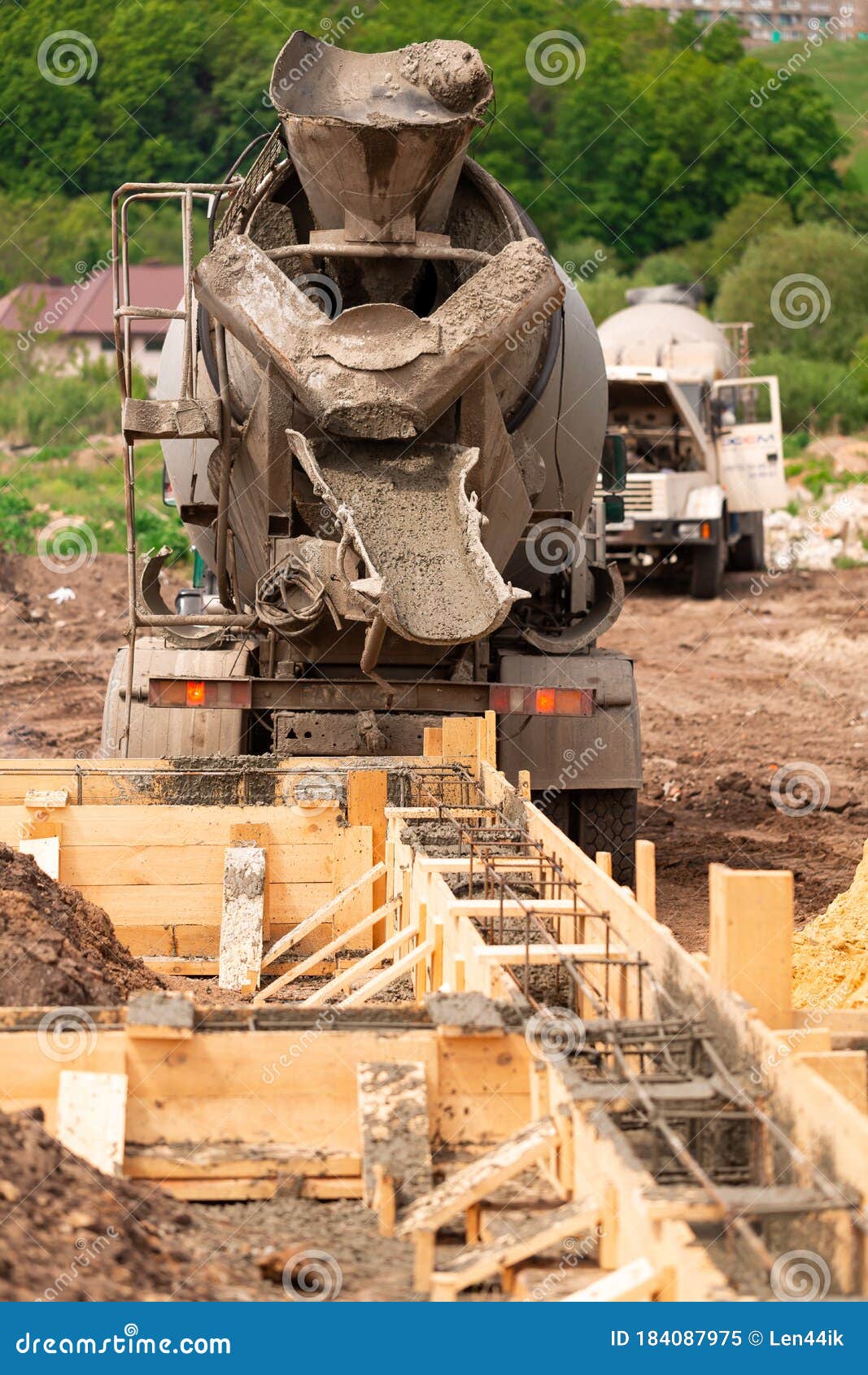 Lay of the Cement or Concrete into the Foundation Formwork with ...