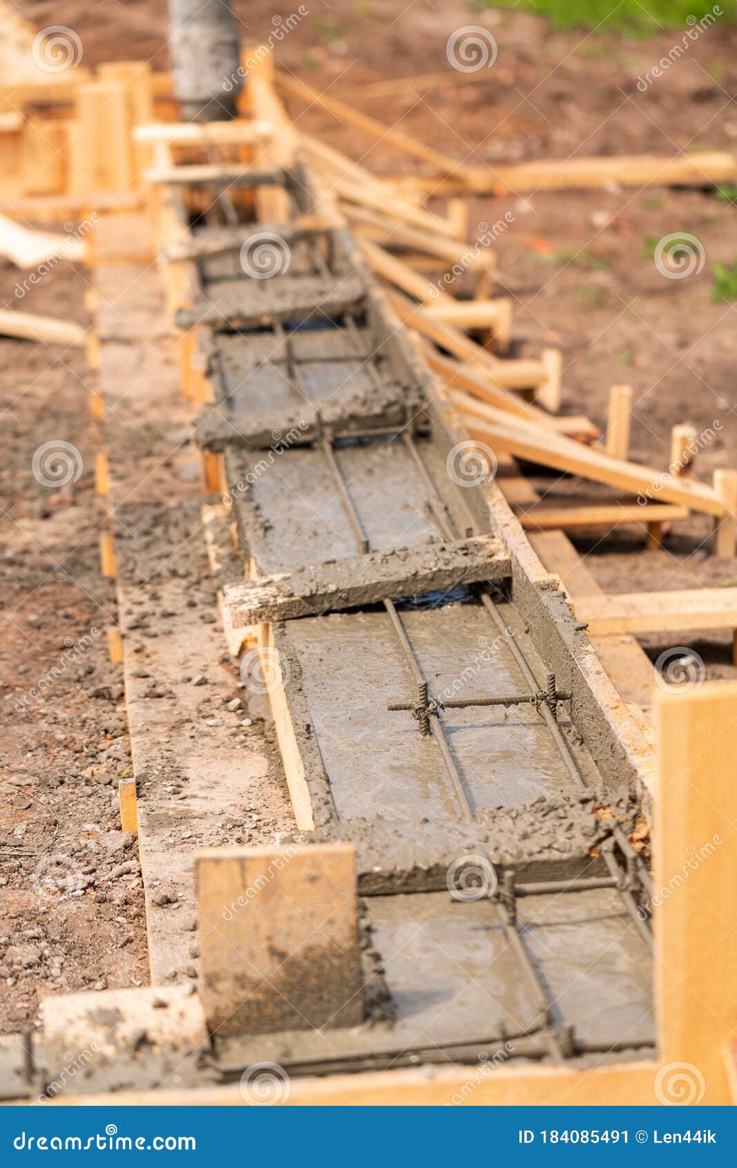 Lay of the Cement or Concrete into the Foundation Formwork with ...